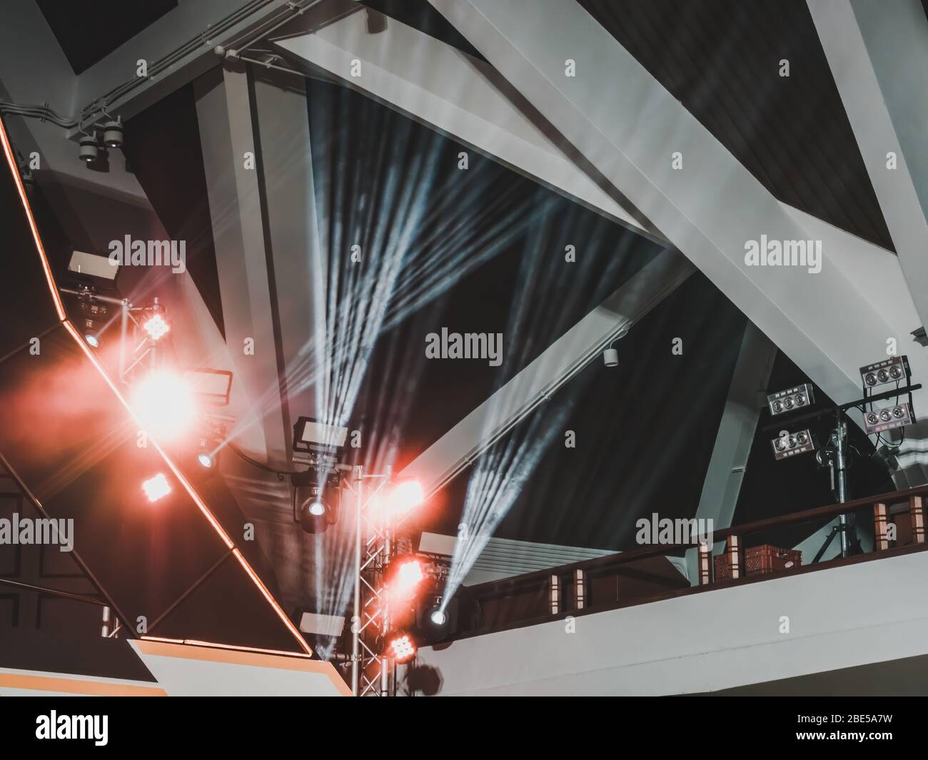 Close up of orange stage spotlight at an E-sport competition event ...