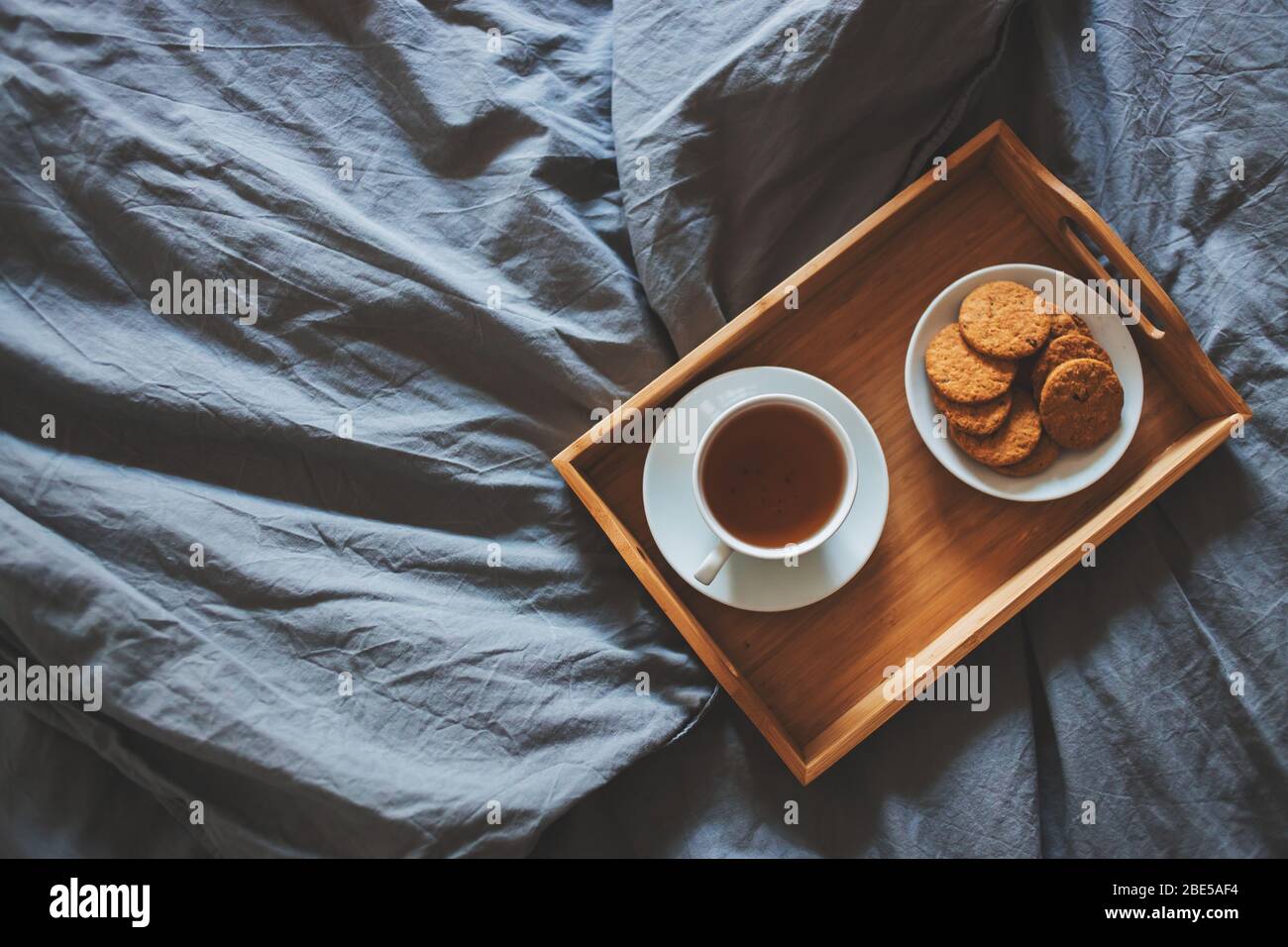 Top view of the morning Breakfast on the gray bed Stock Photo - Alamy