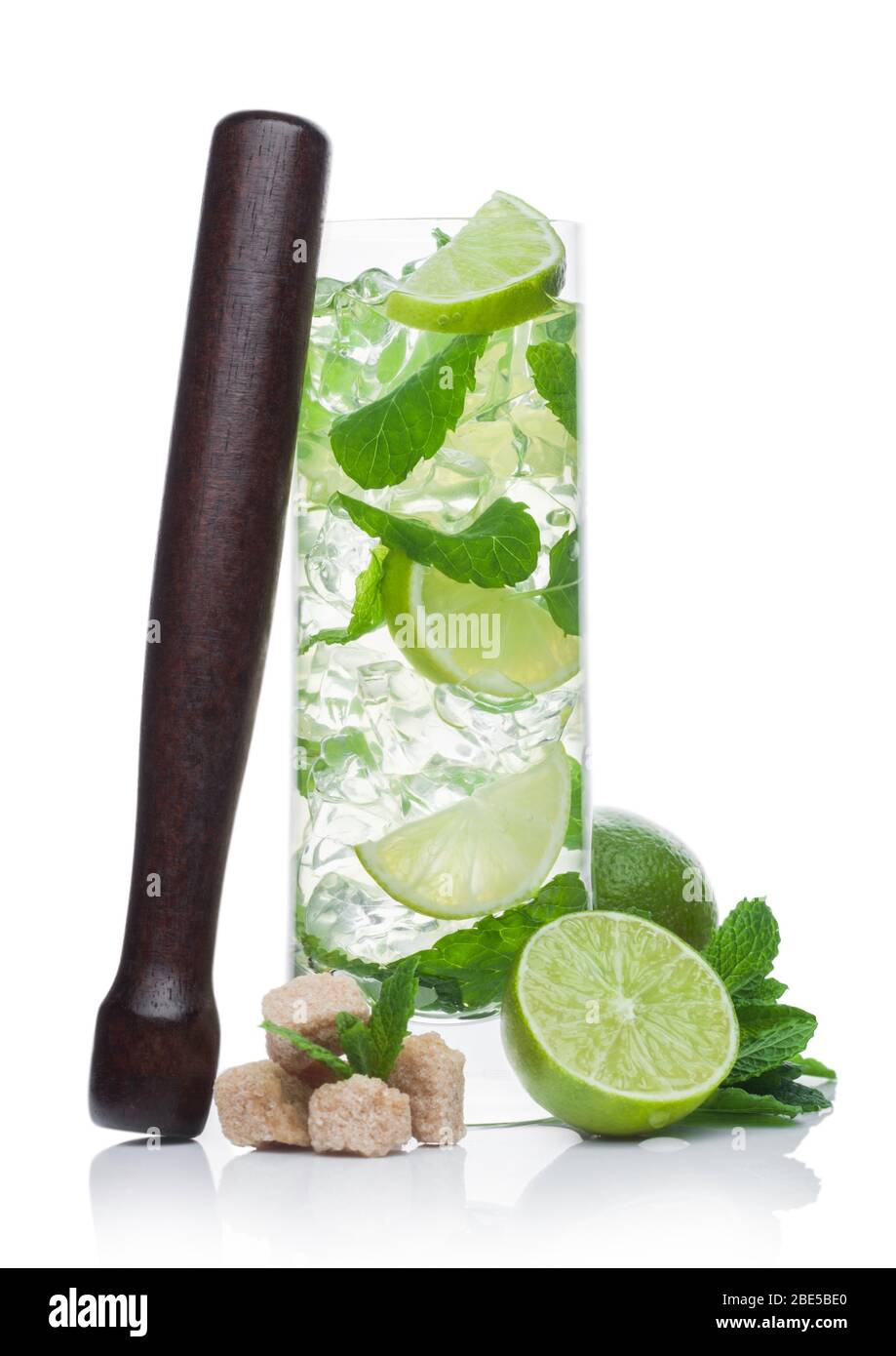 Highball glass of Mojito summer alcoholic cocktail with ice cubes mint ...