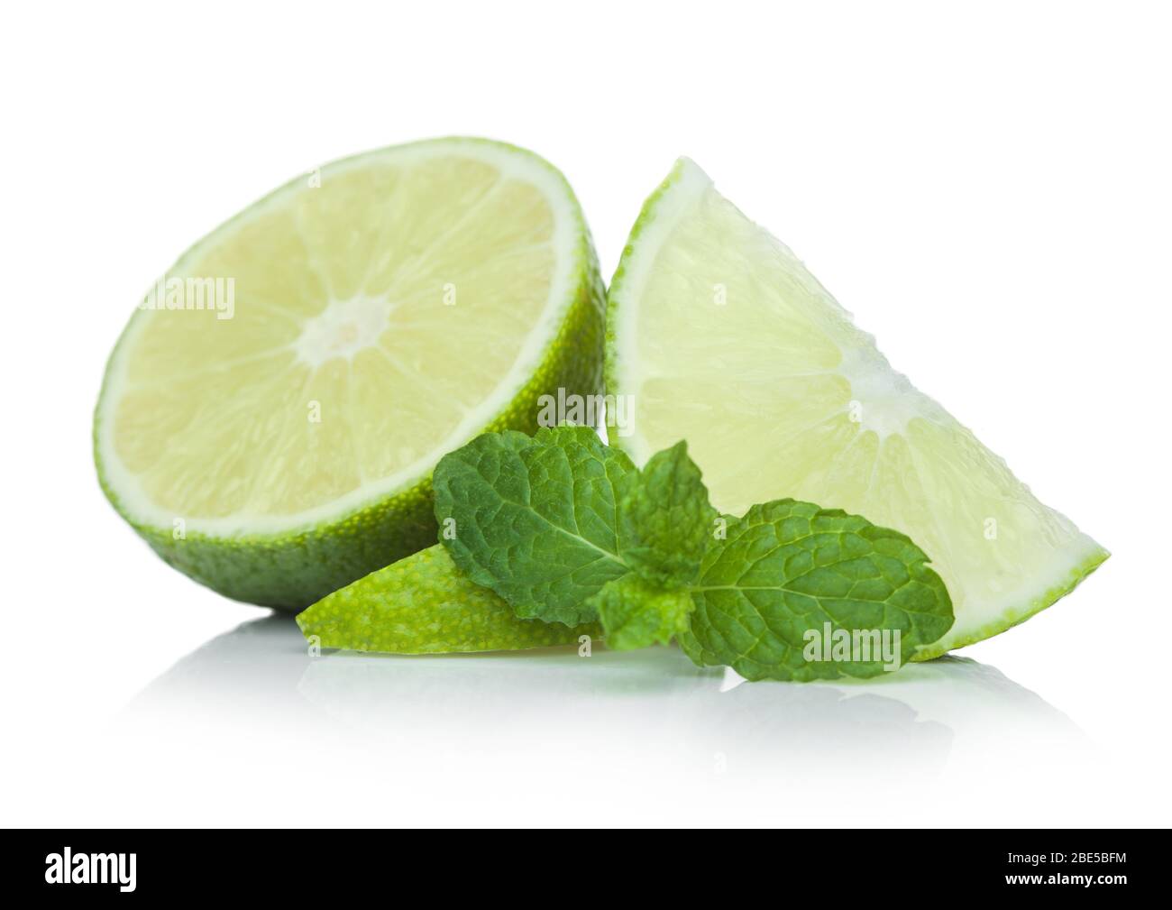Fresh raw lime with mint leaf on white background for mojito cocktail ...