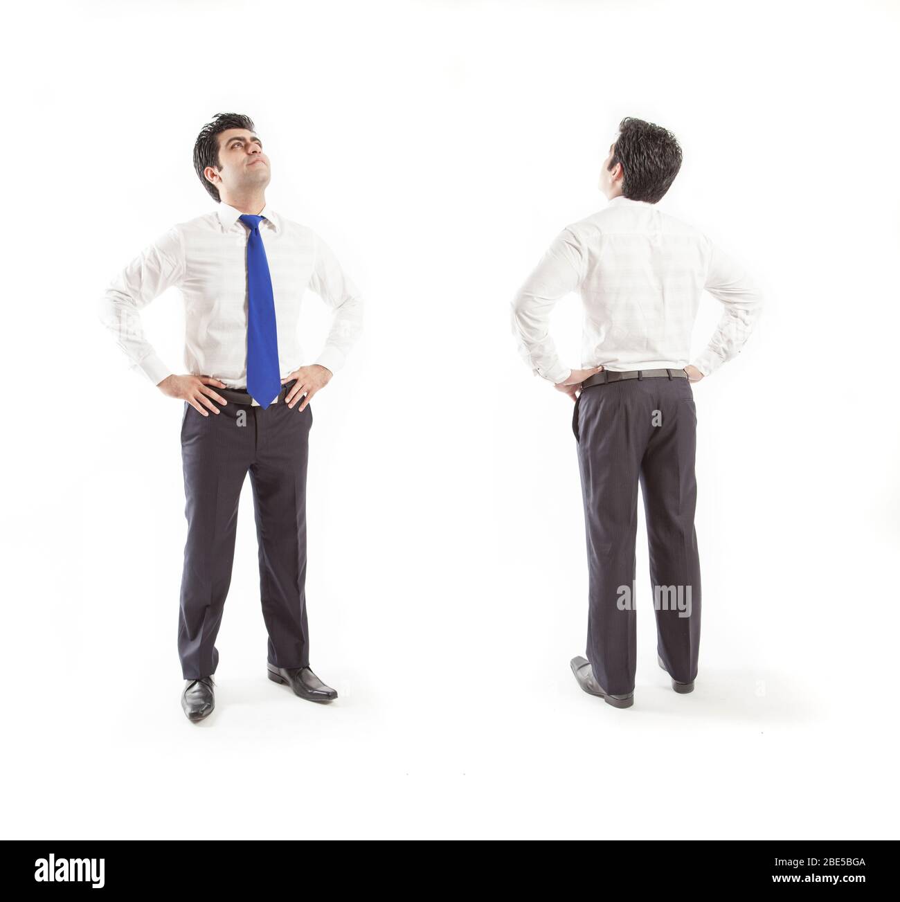 Young corporate office man looking up visioning future of work both ...