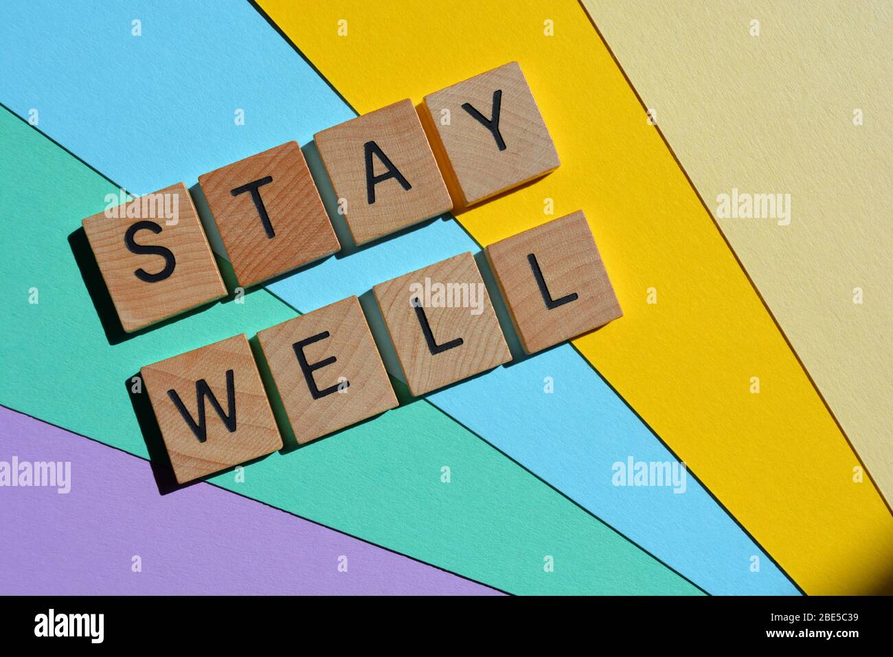 Stay Well, words on colorful background Stock Photo - Alamy