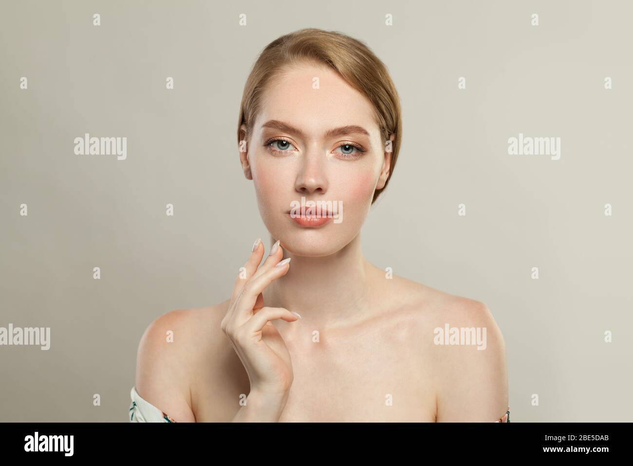 Portrait of healthy model with clear skin on white background Stock ...
