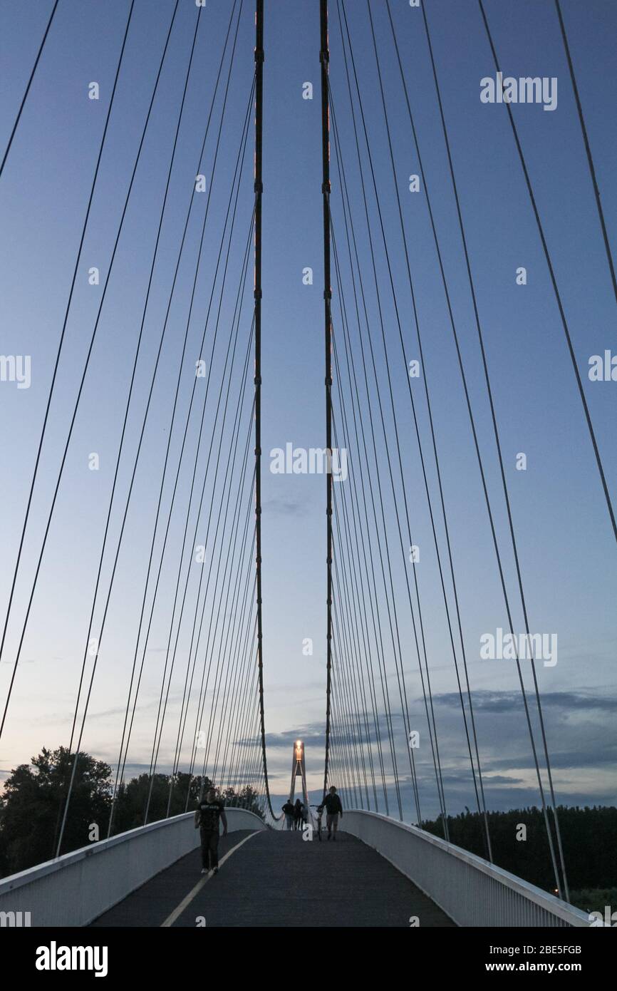 OSIJEK, CROATIA - JUNE 4, 2016: Pedestrian suspension bridge with a ...