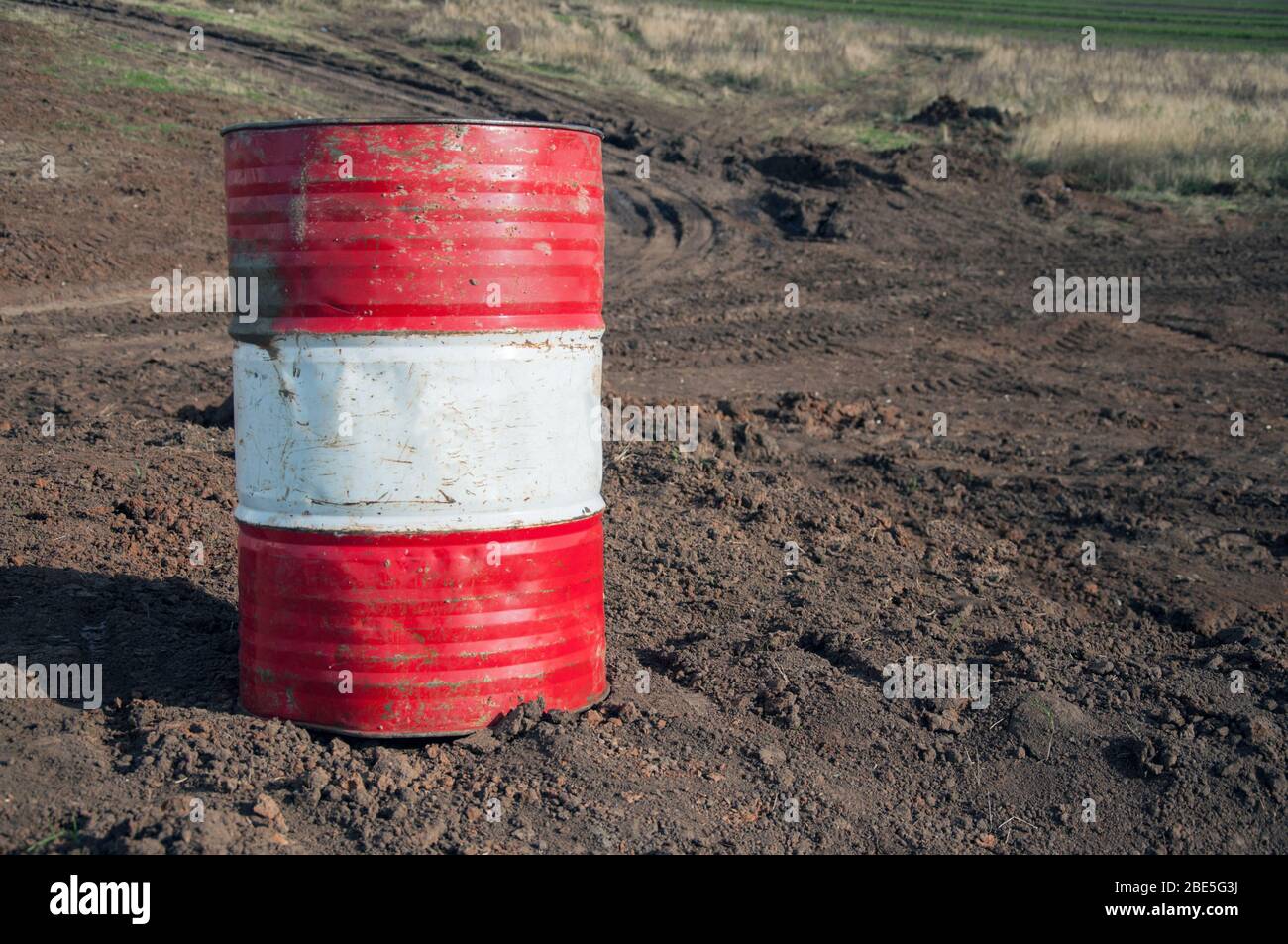 Old metal barrels from under engine oil. Barrels for storing industrial ...