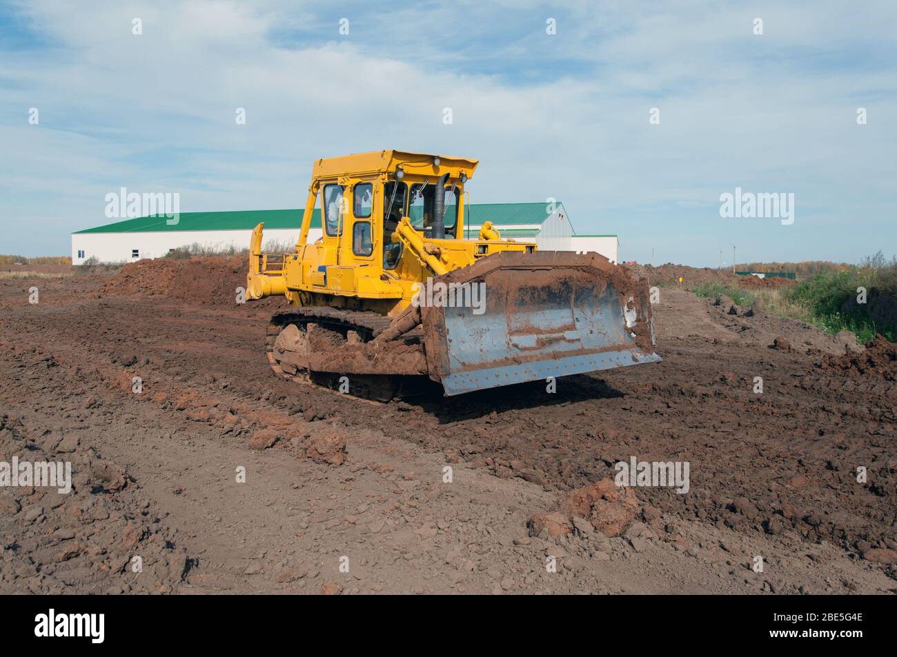 Large construction bulldozer at a construction site. Ground planning at ...