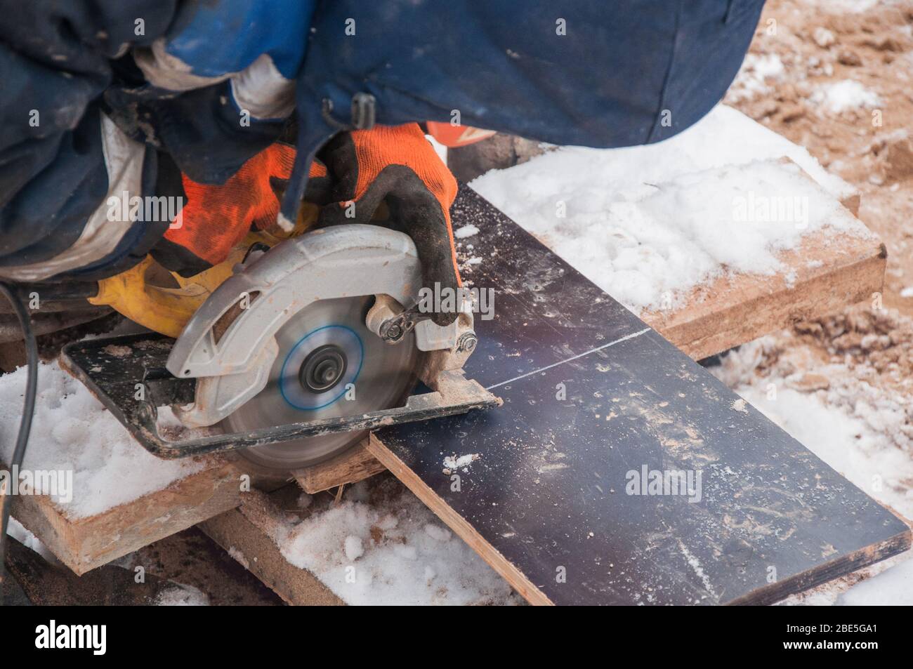 Circular saw for cutting wood. Construction site, the process of ...