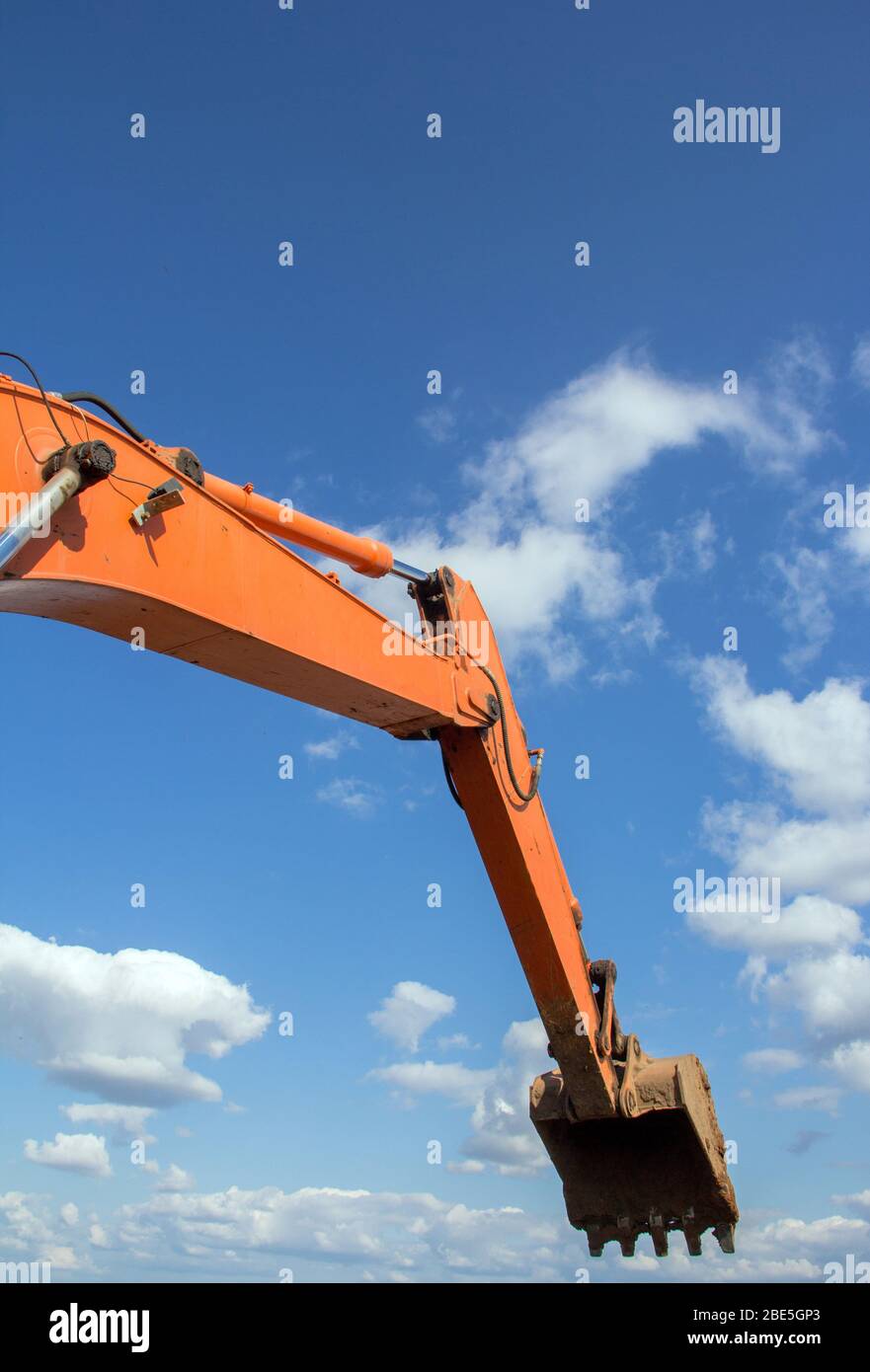 Excavator hydraulic bucket for loading materials against the sky Stock ...