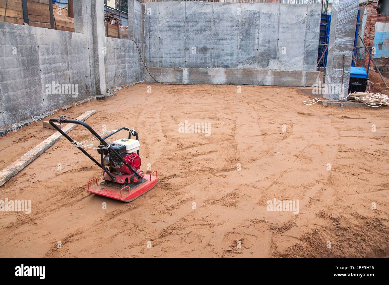 Vibratory rammer for construction work. Construction sand rammer Stock ...