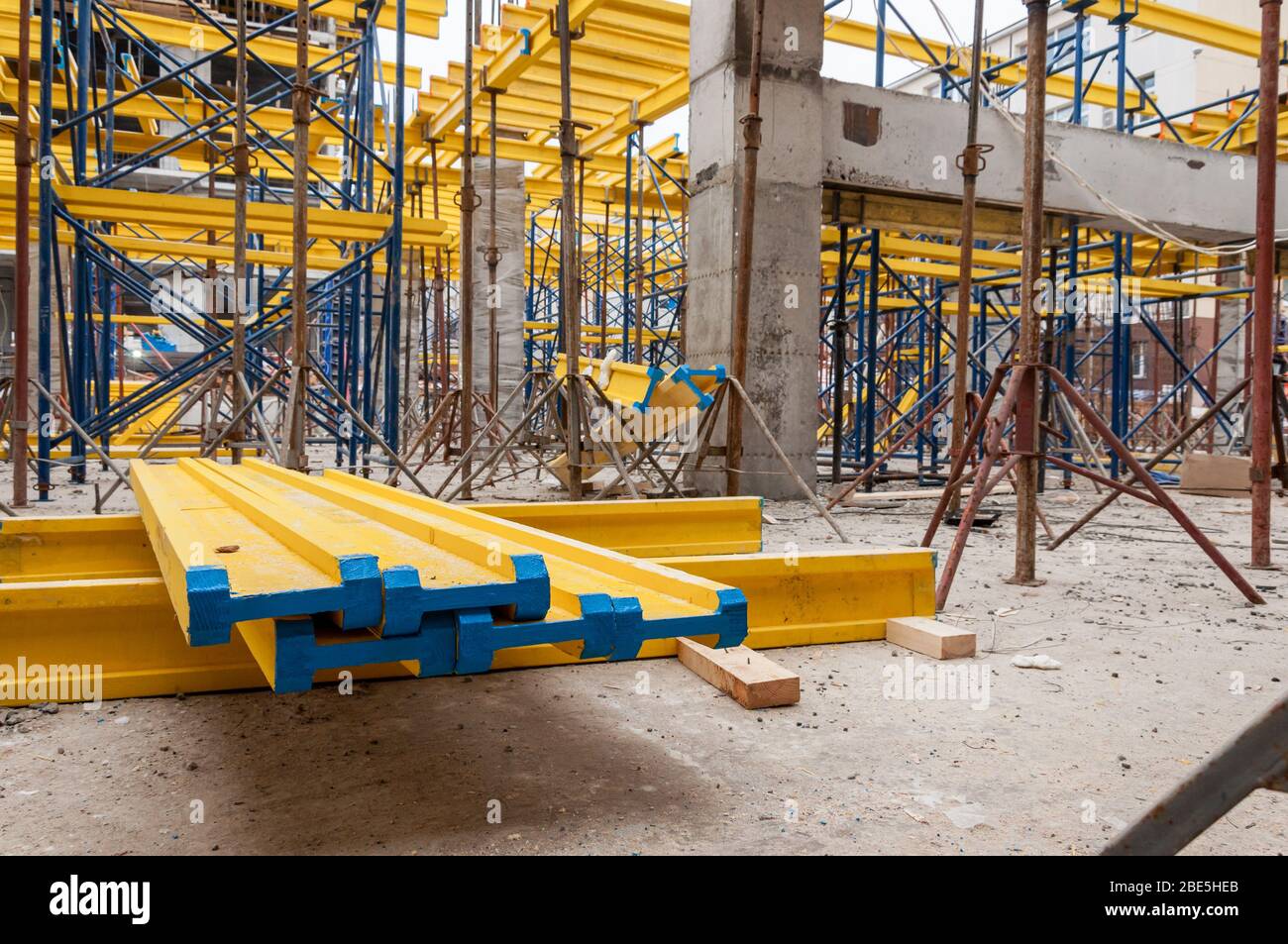 Equipment in the form of wooden beams for fastening formwork in ...