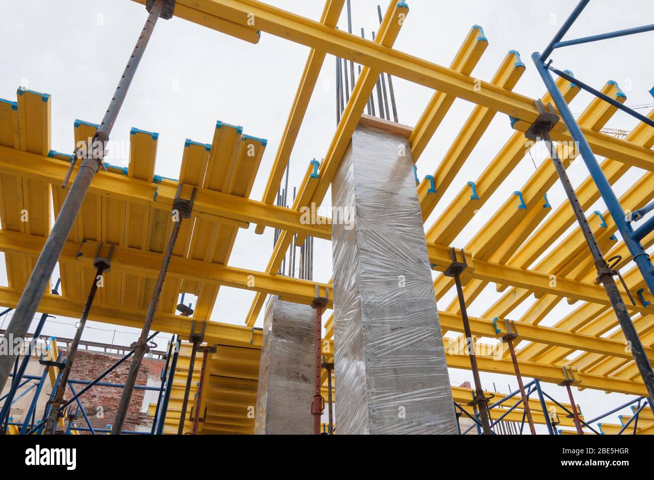 Equipment in the form of wooden beams for fastening formwork in ...