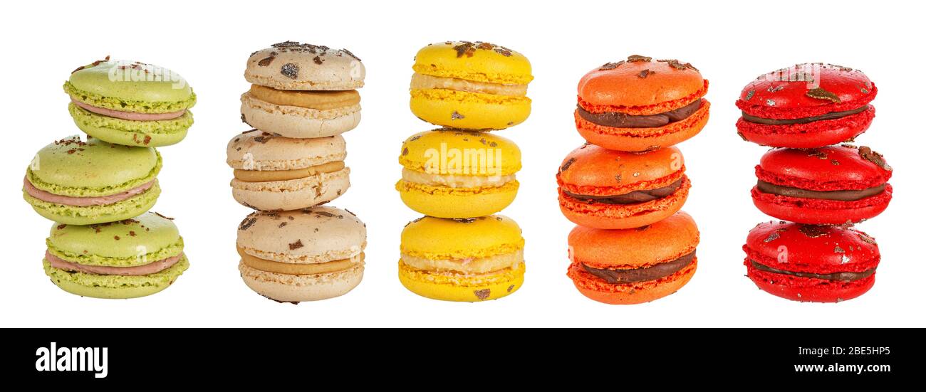 Stacks of french colorful macaroons in row isolated on white background ...