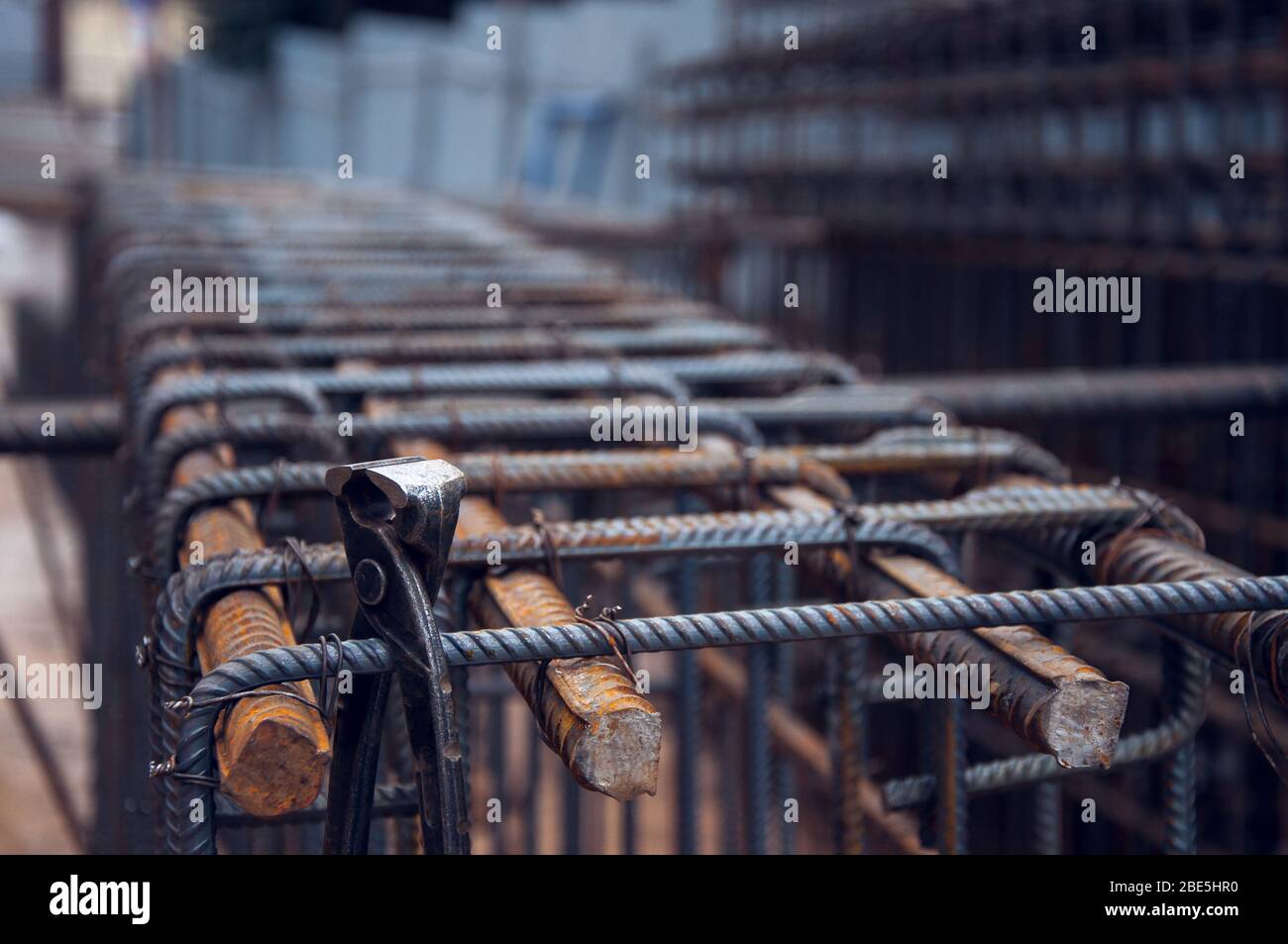 Tool for knitting metal rods with wire. Pliers for attaching the rebars ...