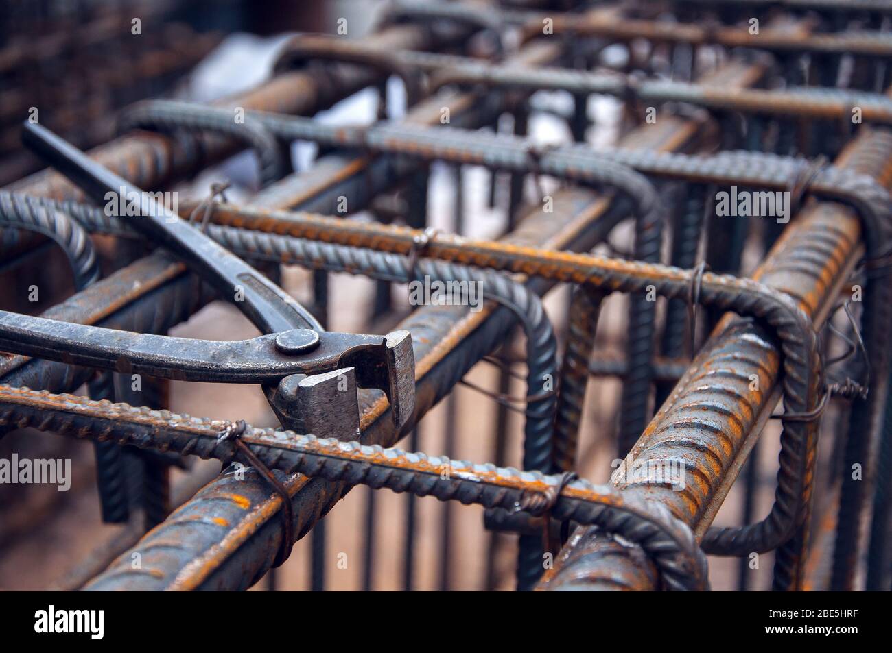 Tool for knitting metal rods with wire. Pliers for attaching the rebars ...