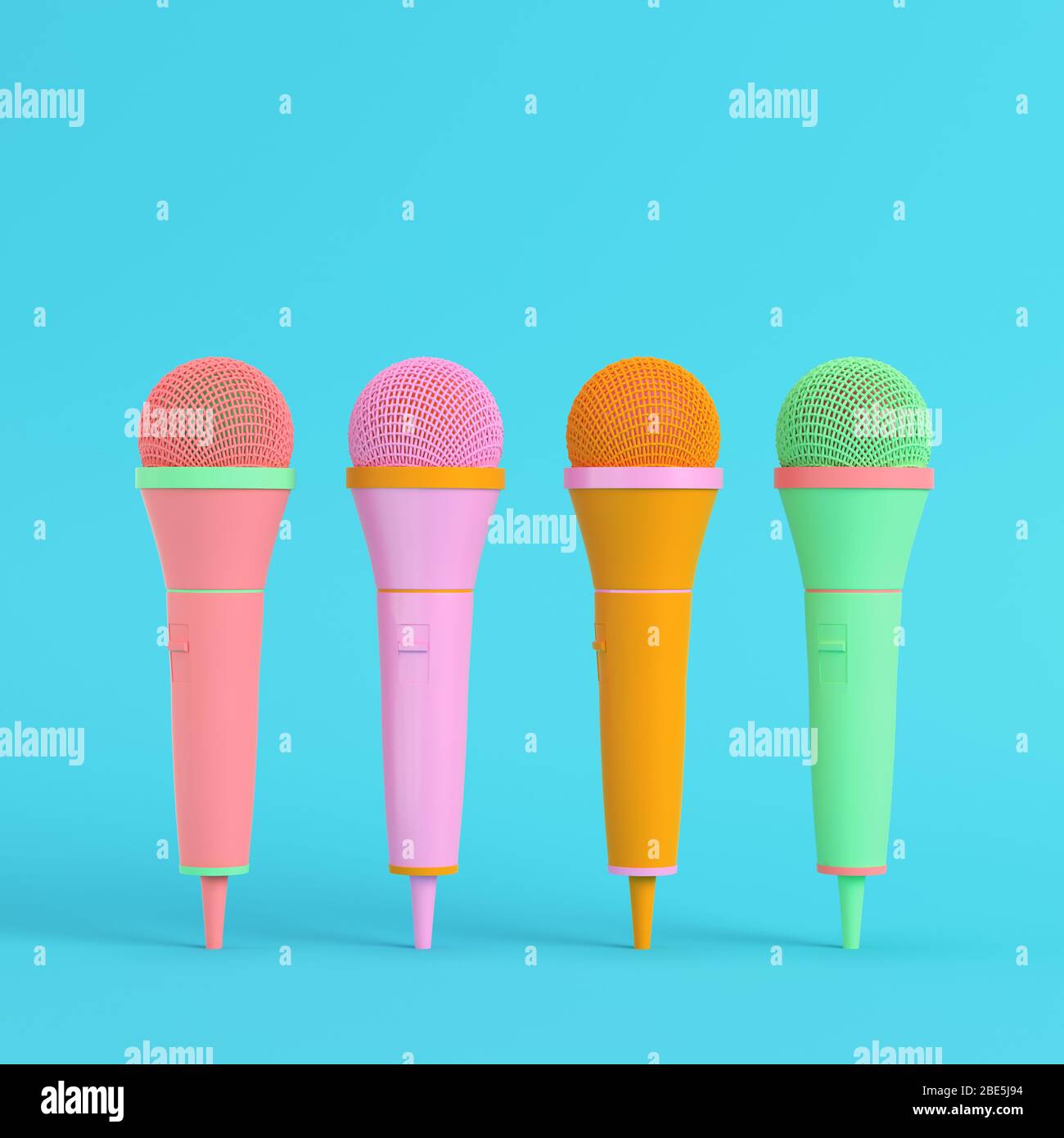 Four colorful microphones on bright blue background in pastel colors ...