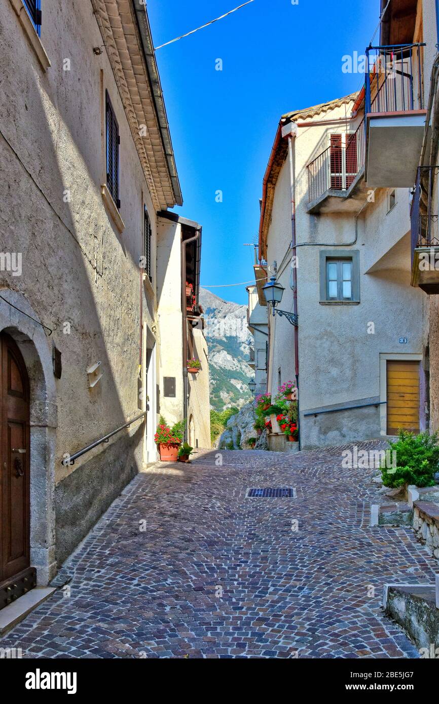 A narrow street between the old houses of Castrovalva, a town in the ...