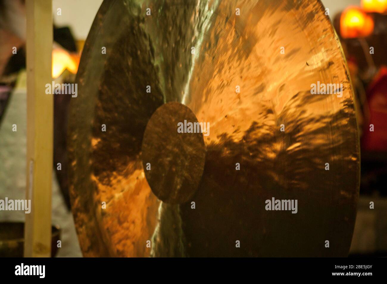 Golden oriental gong Stock Photo - Alamy
