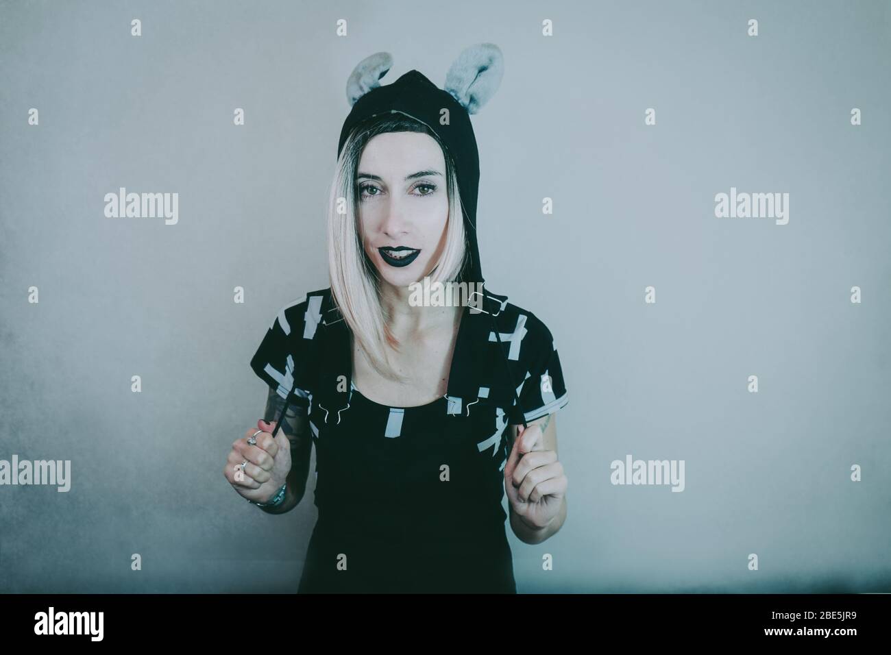 Gothic style portrait of a young woman with cool style Stock Photo - Alamy