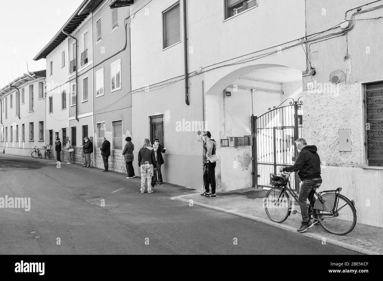 Italy, Lombardy, Ossona, people in line to buy bread Stock Photo - Alamy