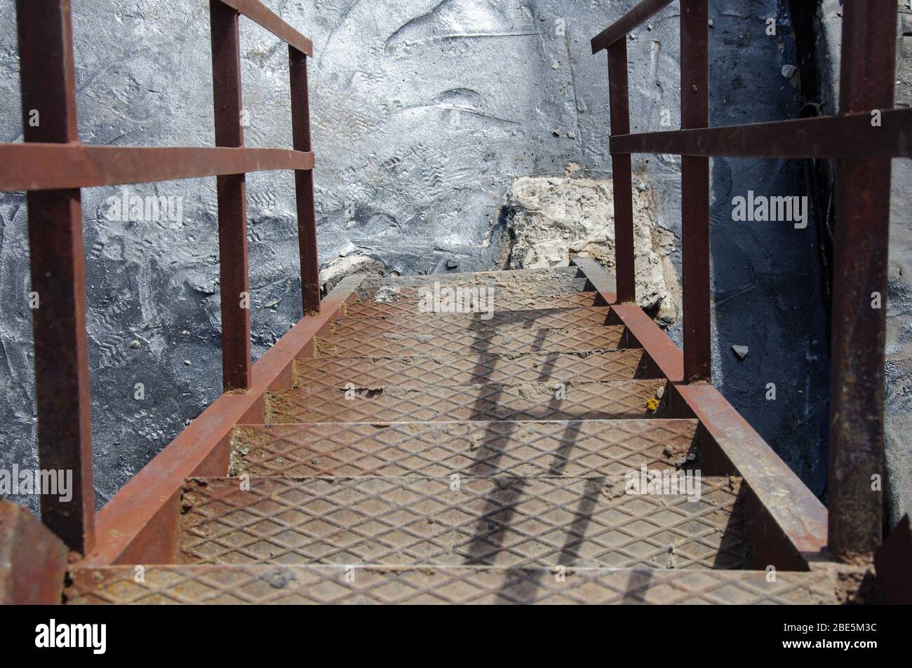 Evacuation staircase leading to a rooftop of a building. Fire exit from ...