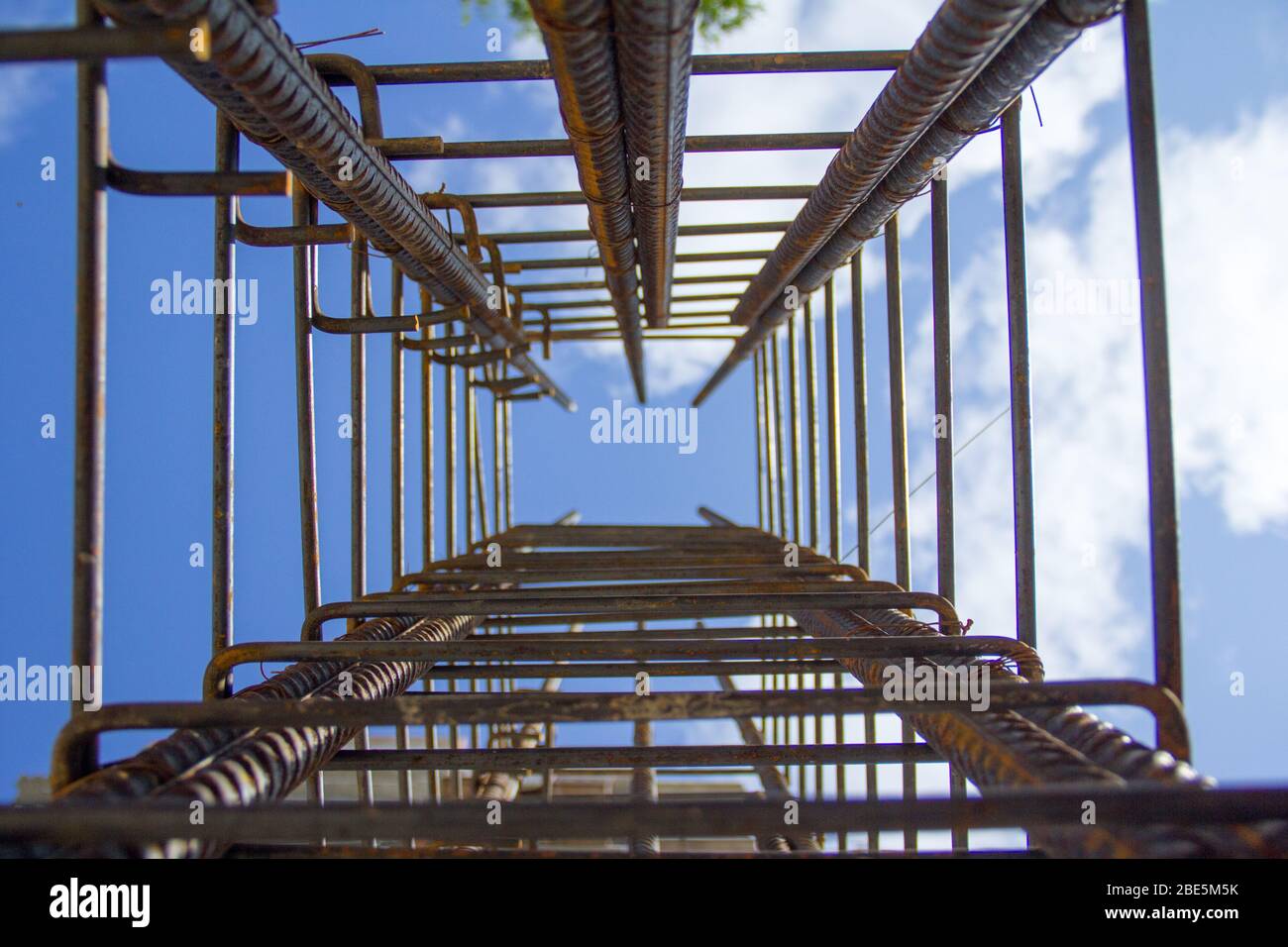 Steel bar frame for pouring concrete. Construction rebar with traces of ...