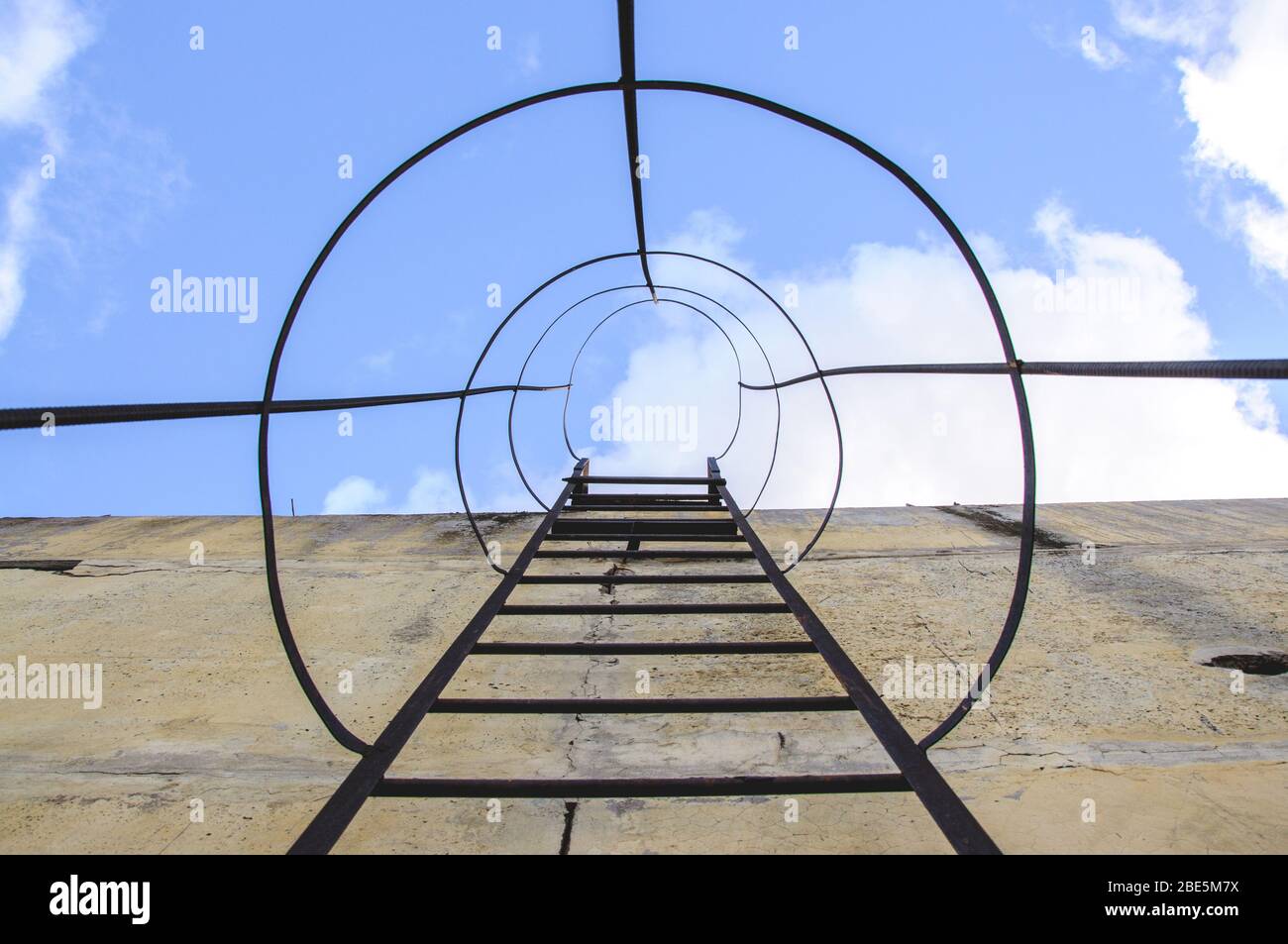 Evacuation staircase leading to a rooftop of a building. Fire exit from ...