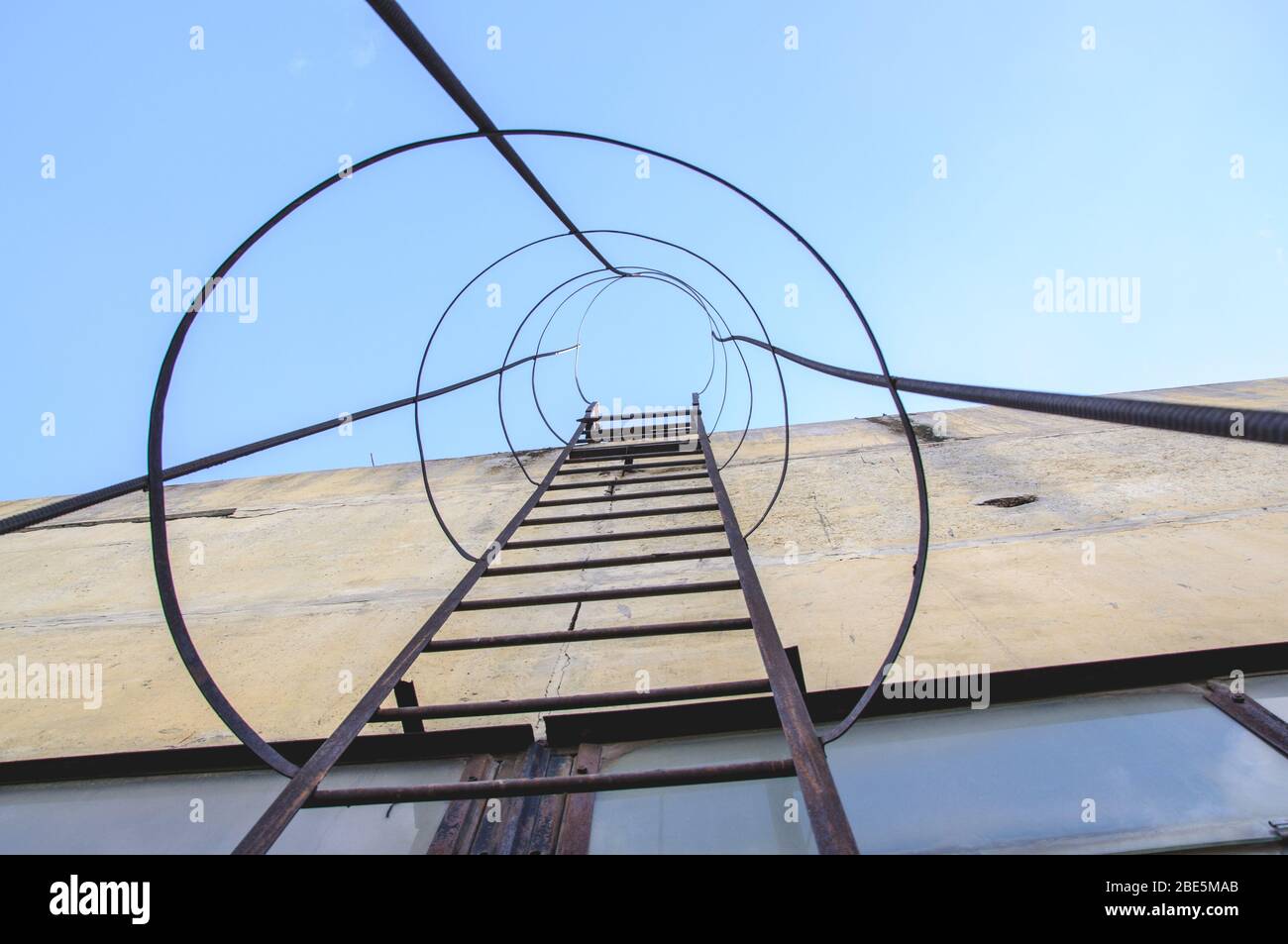 Evacuation staircase leading to a rooftop of a building. Fire exit from ...
