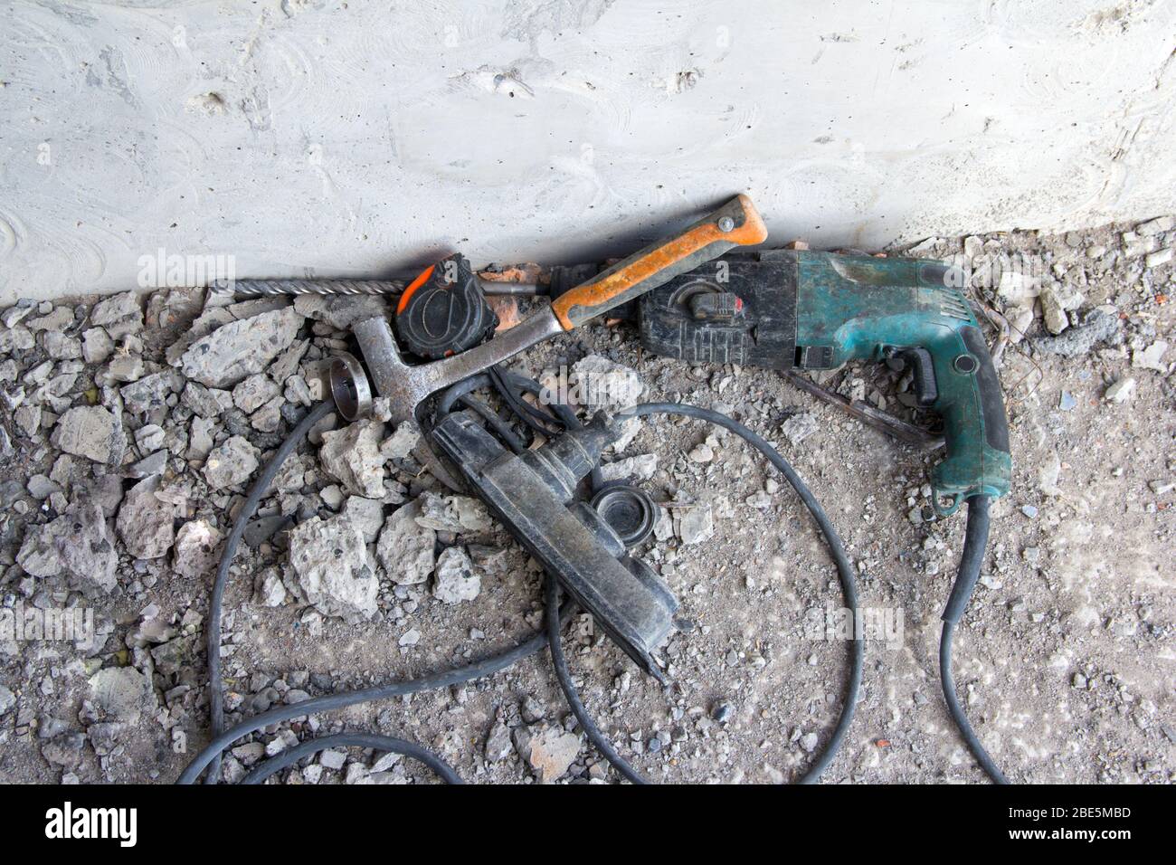 Construction tool on the floor. Tool for mounting parts at a ...