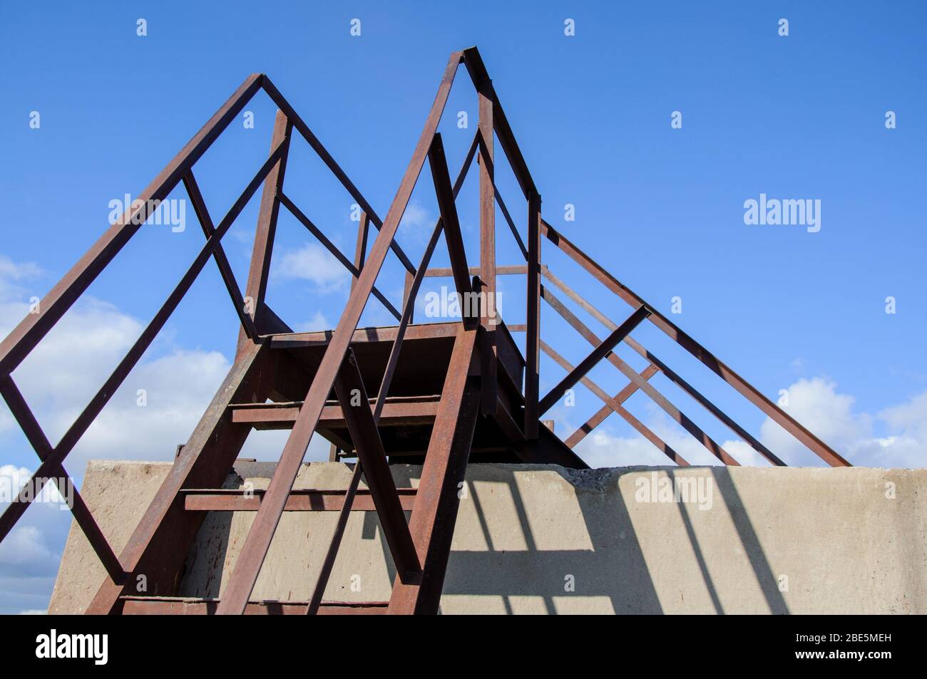Evacuation staircase leading to a rooftop of a building. Fire exit from ...