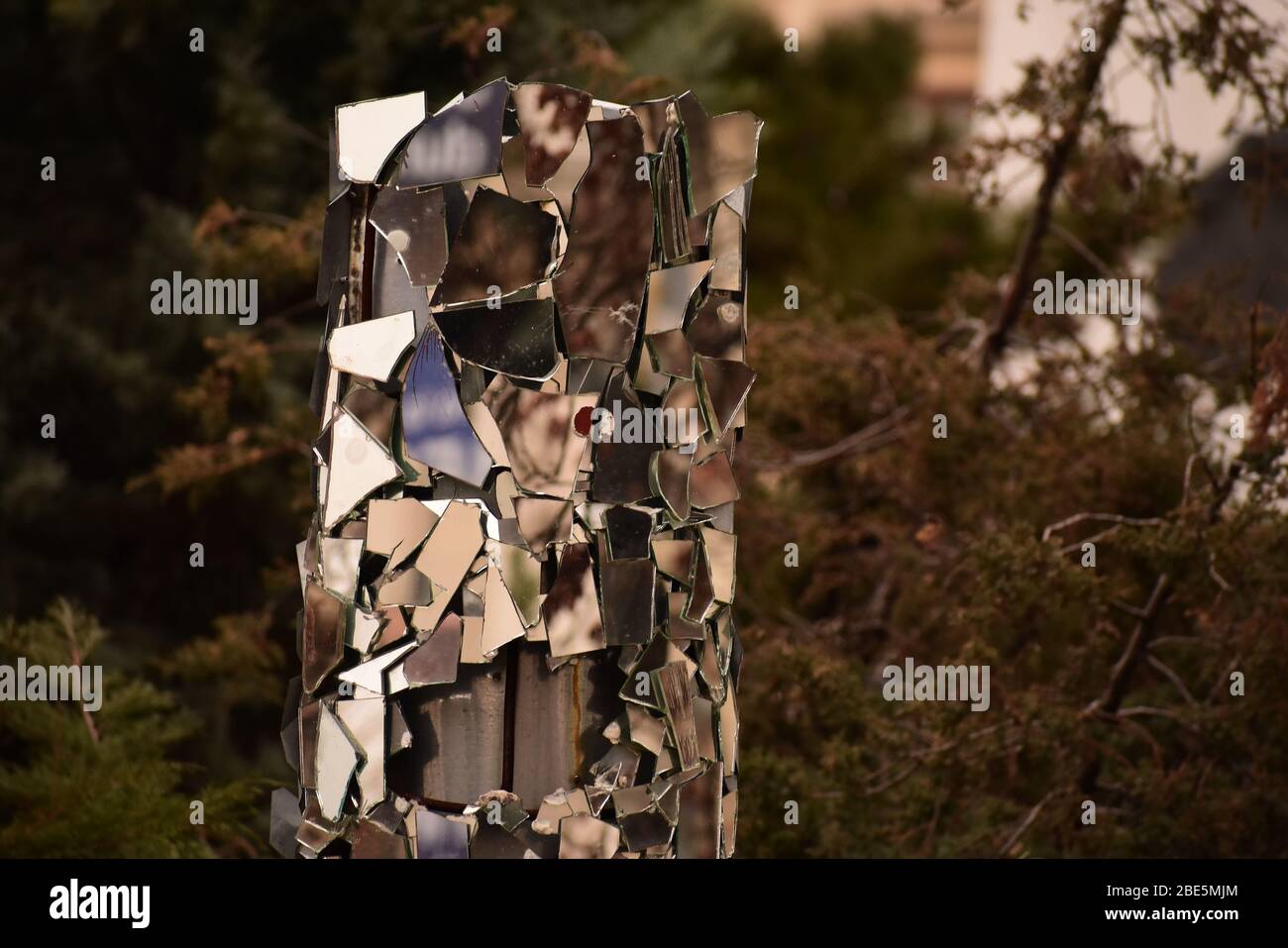 Reflective metal mirror statue in a park in Bucharest Stock Photo - Alamy
