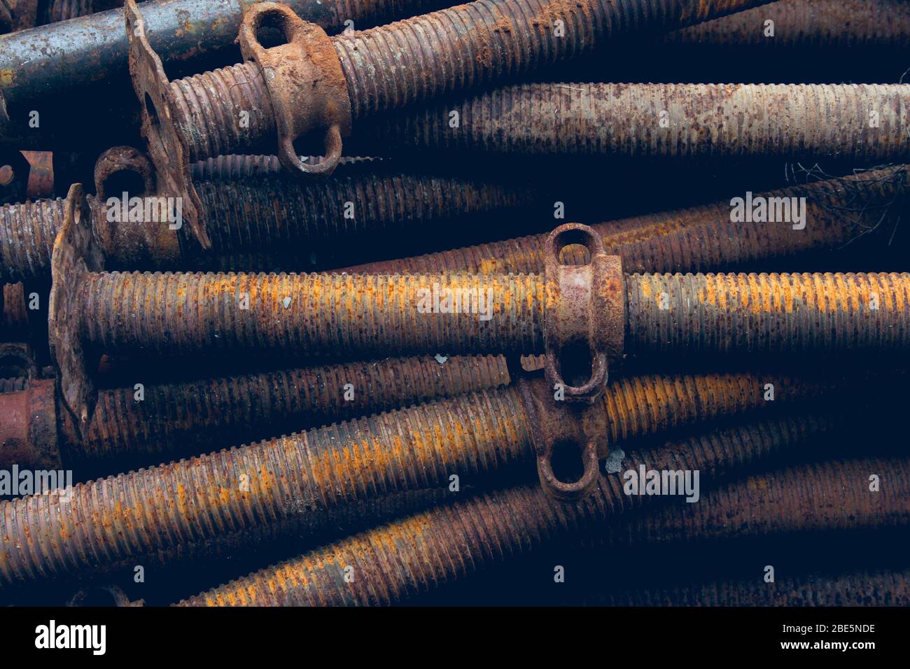 Pipes used for fastening wooden beams during the construction of ...