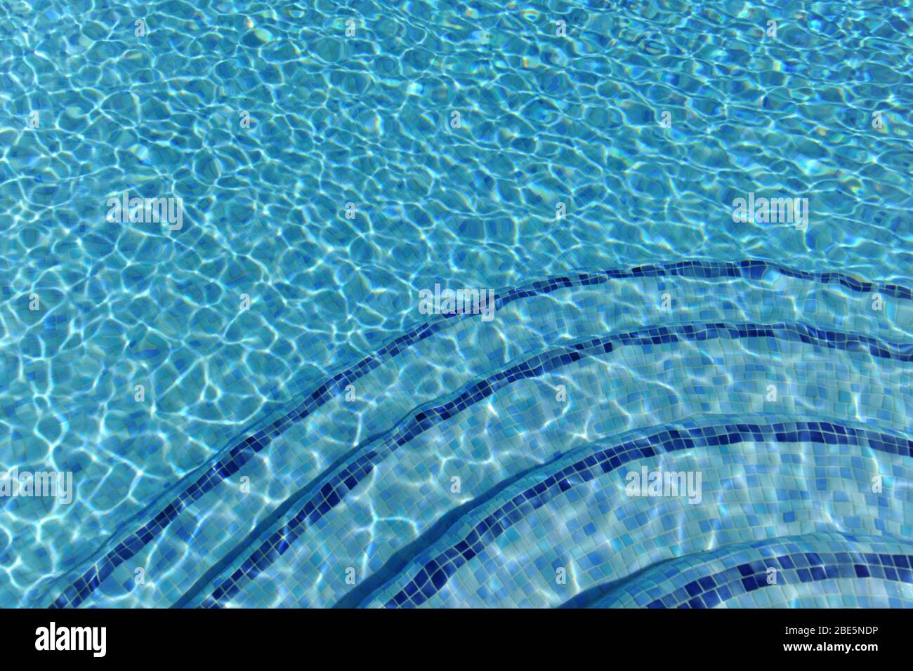 Swimming pool with sparkling water, high angle view Stock Photo - Alamy