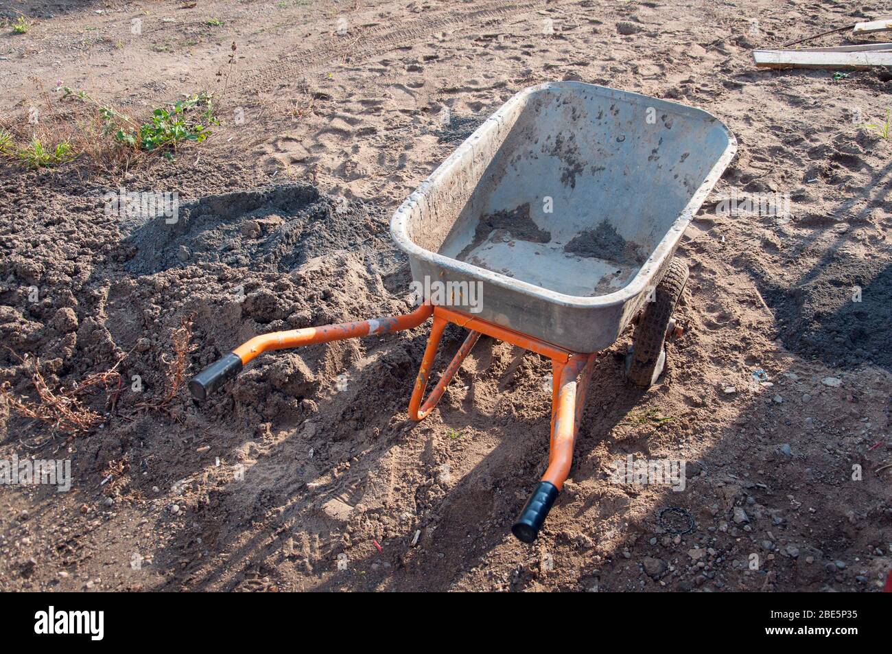 Manual construction trolley for the transport of goods at a ...