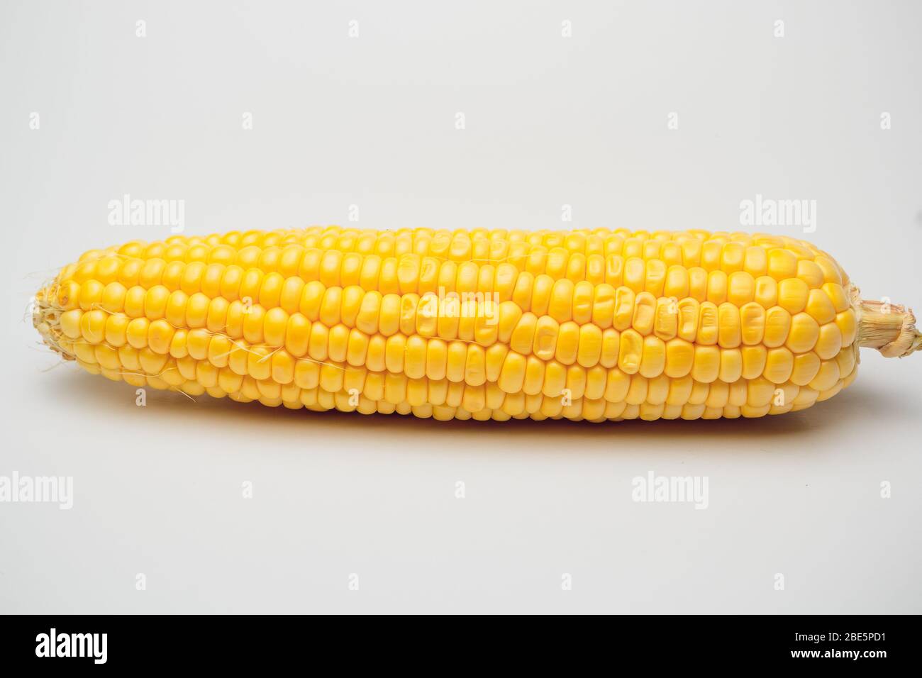 fresh corn vegetable with green leaves isolated on white background ...