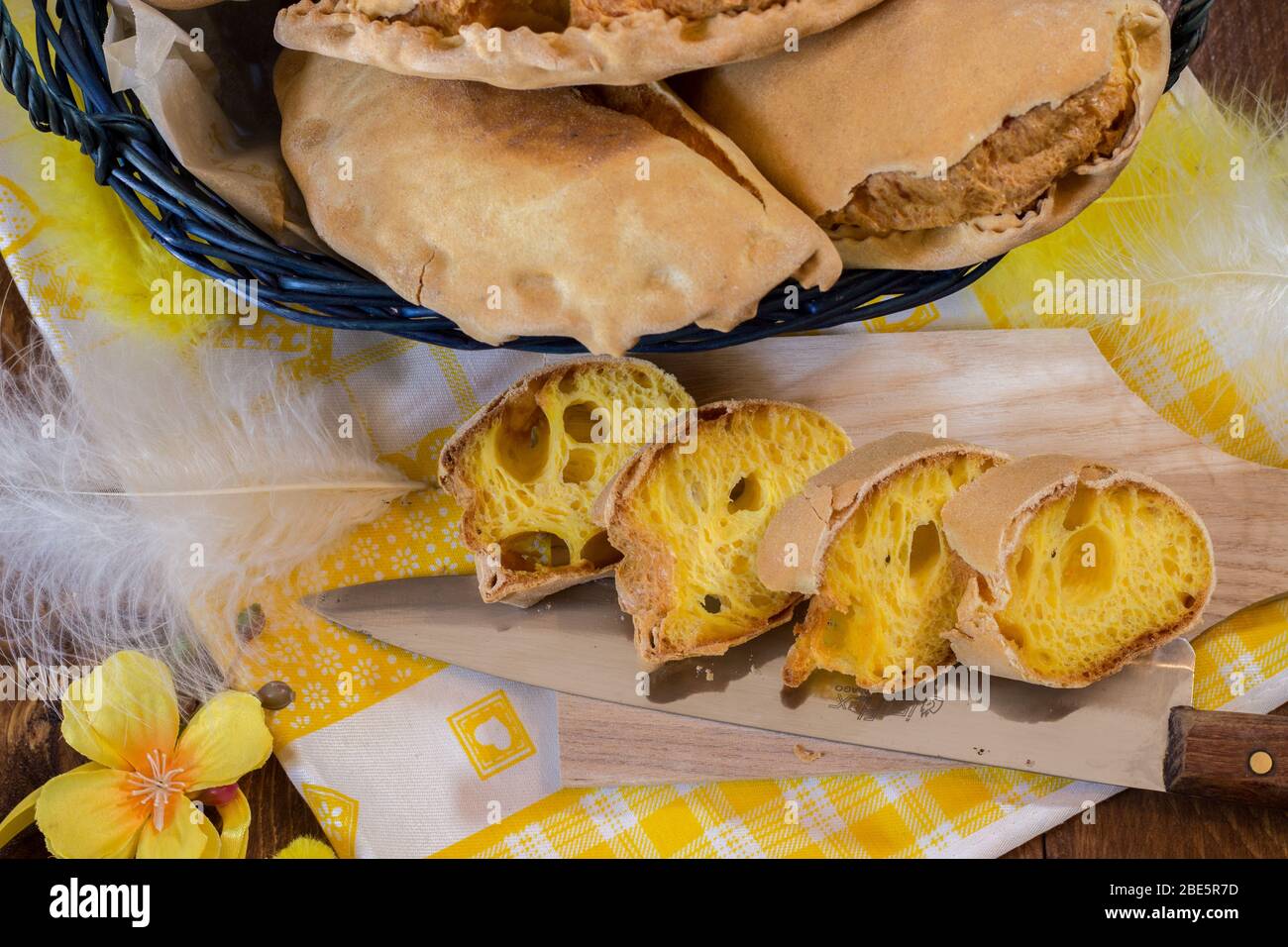 The image shows typical Easter Campania panzerotti in a blue basket and ...