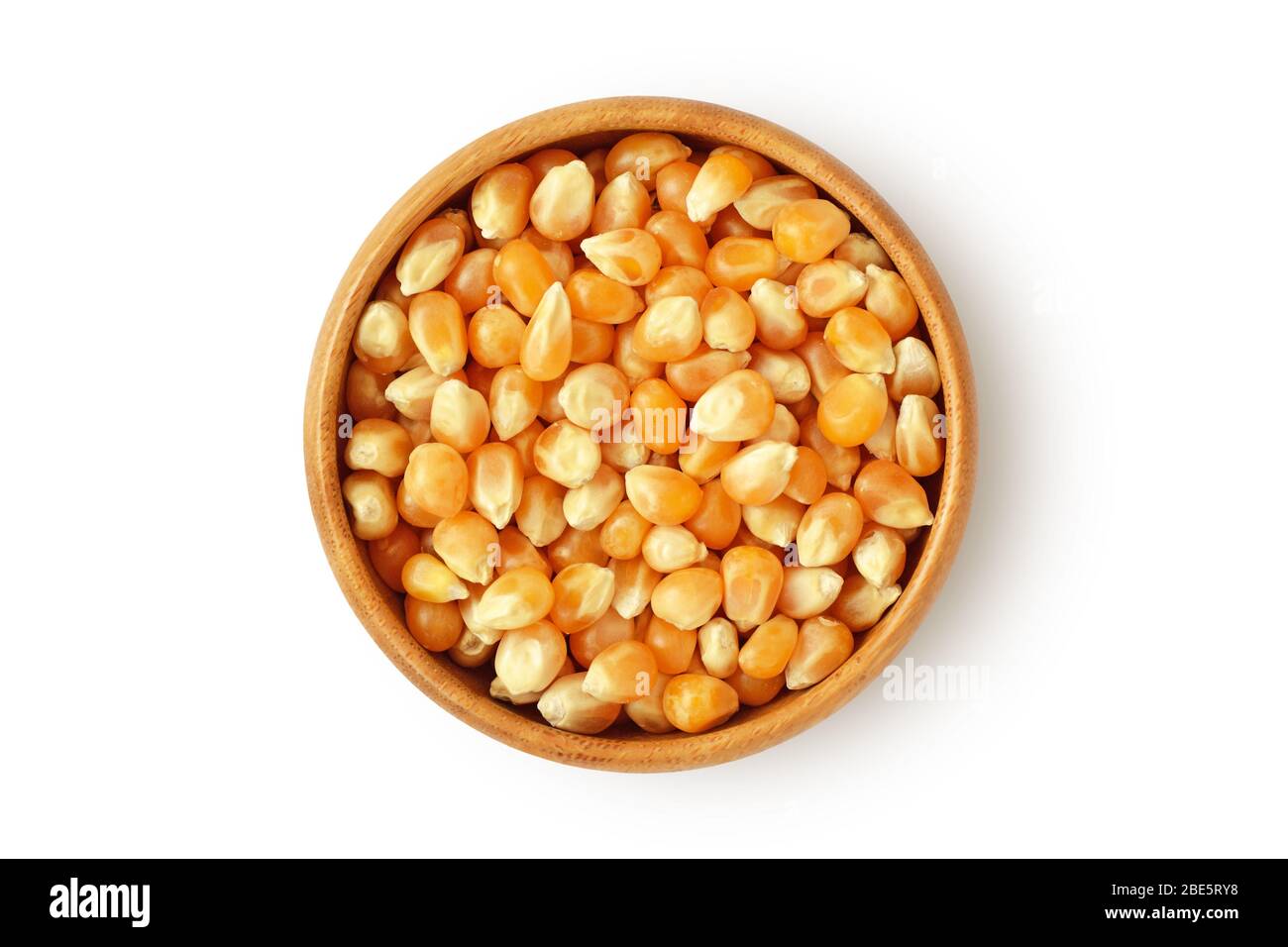 Dried corn kernels in wooden bowl on white background Stock Photo - Alamy