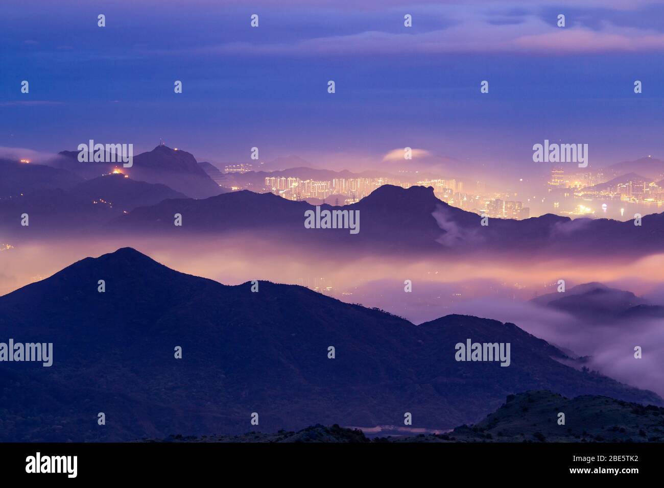 Lion Rock of Hong Kong with sea of frog in spring Stock Photo - Alamy