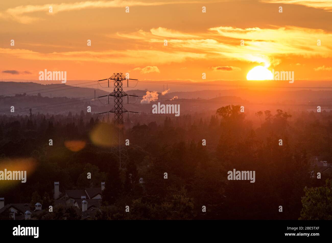 Pretty golden sunset over California town Stock Photo - Alamy