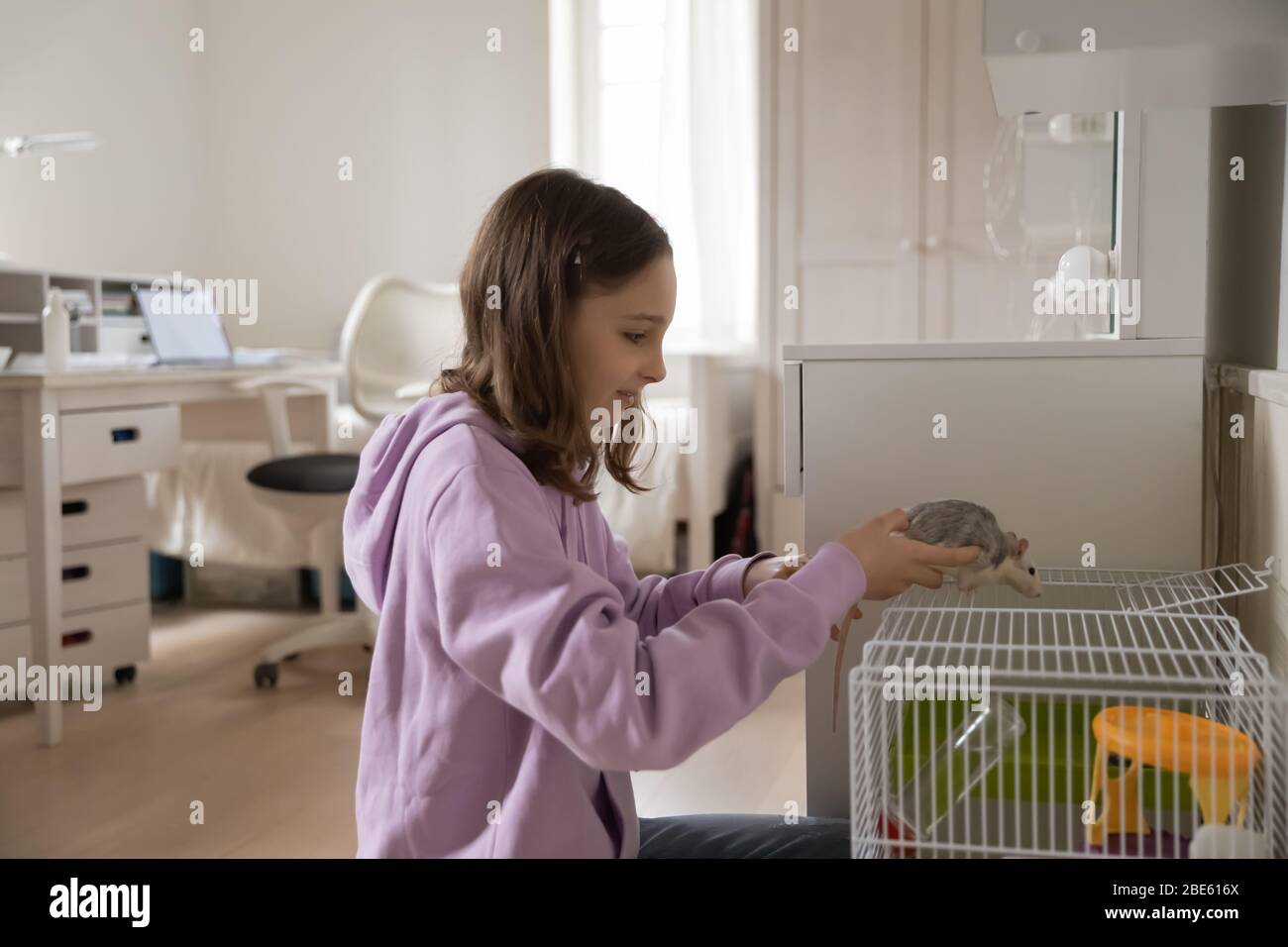 Girl in cage hi-res stock photography and images - Alamy