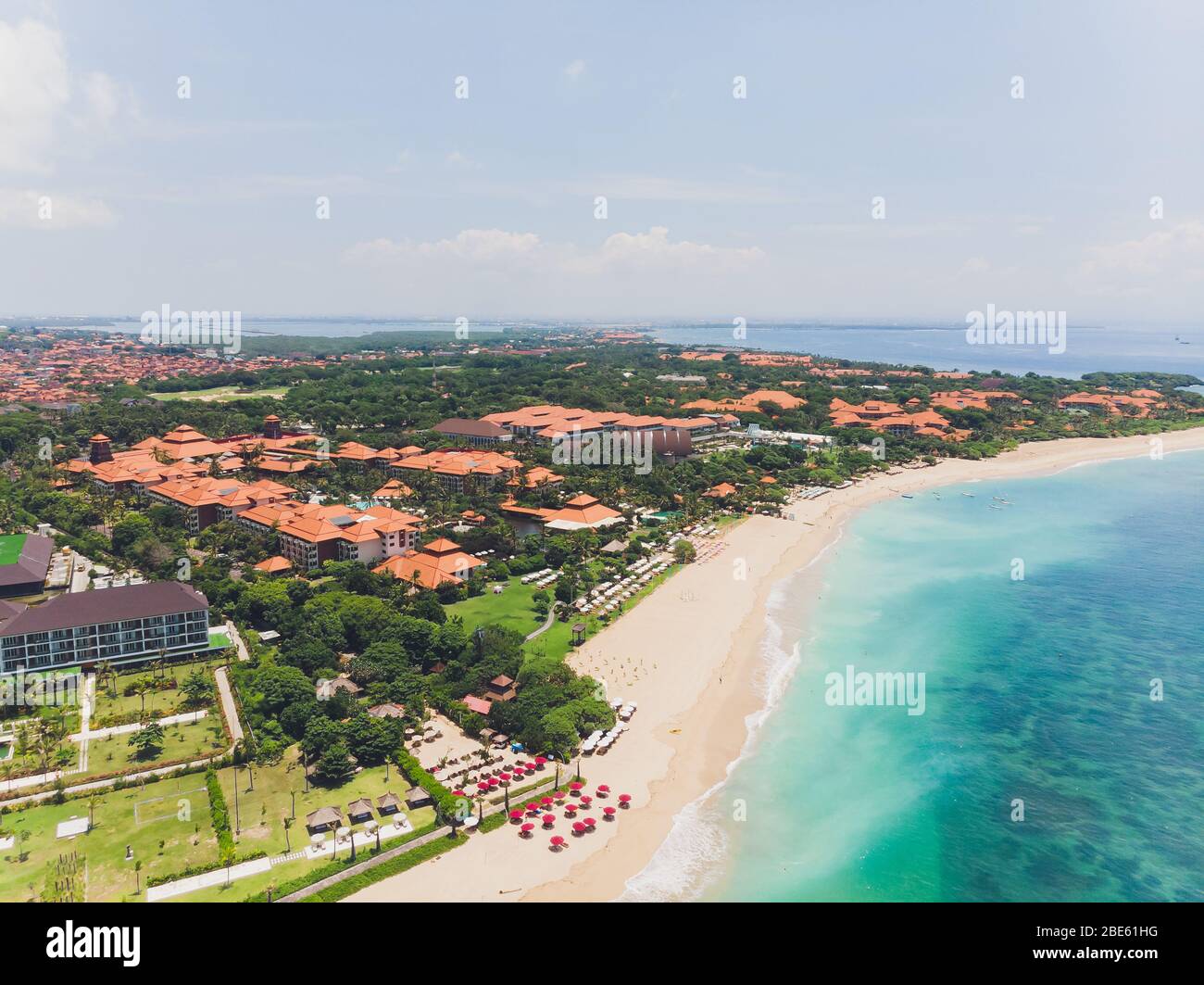 Top down aerial view of rice fields, houses and a road near Ubud in ...
