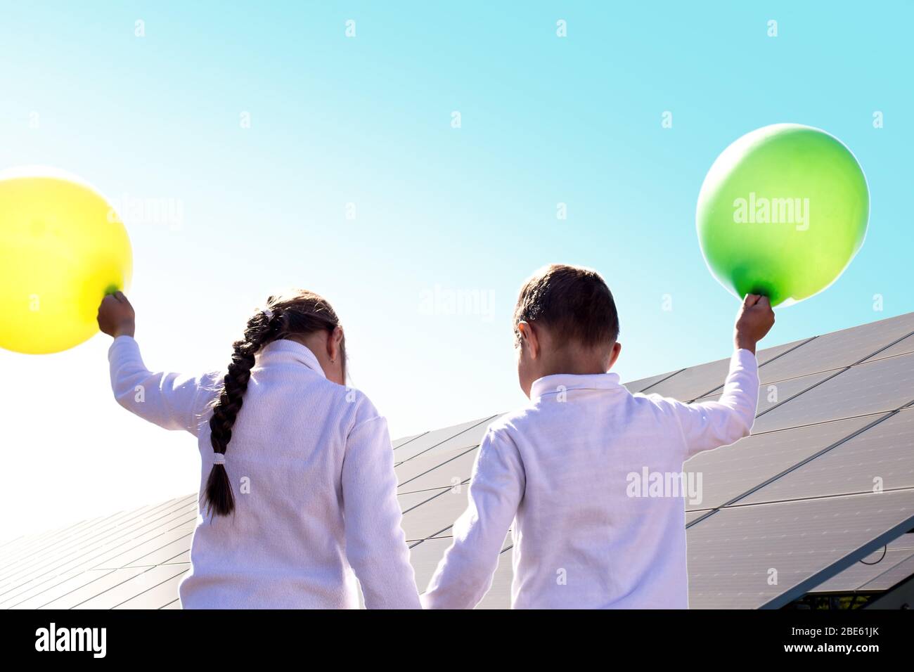 Children get acquainted with solar energy. Green energy and technology ...
