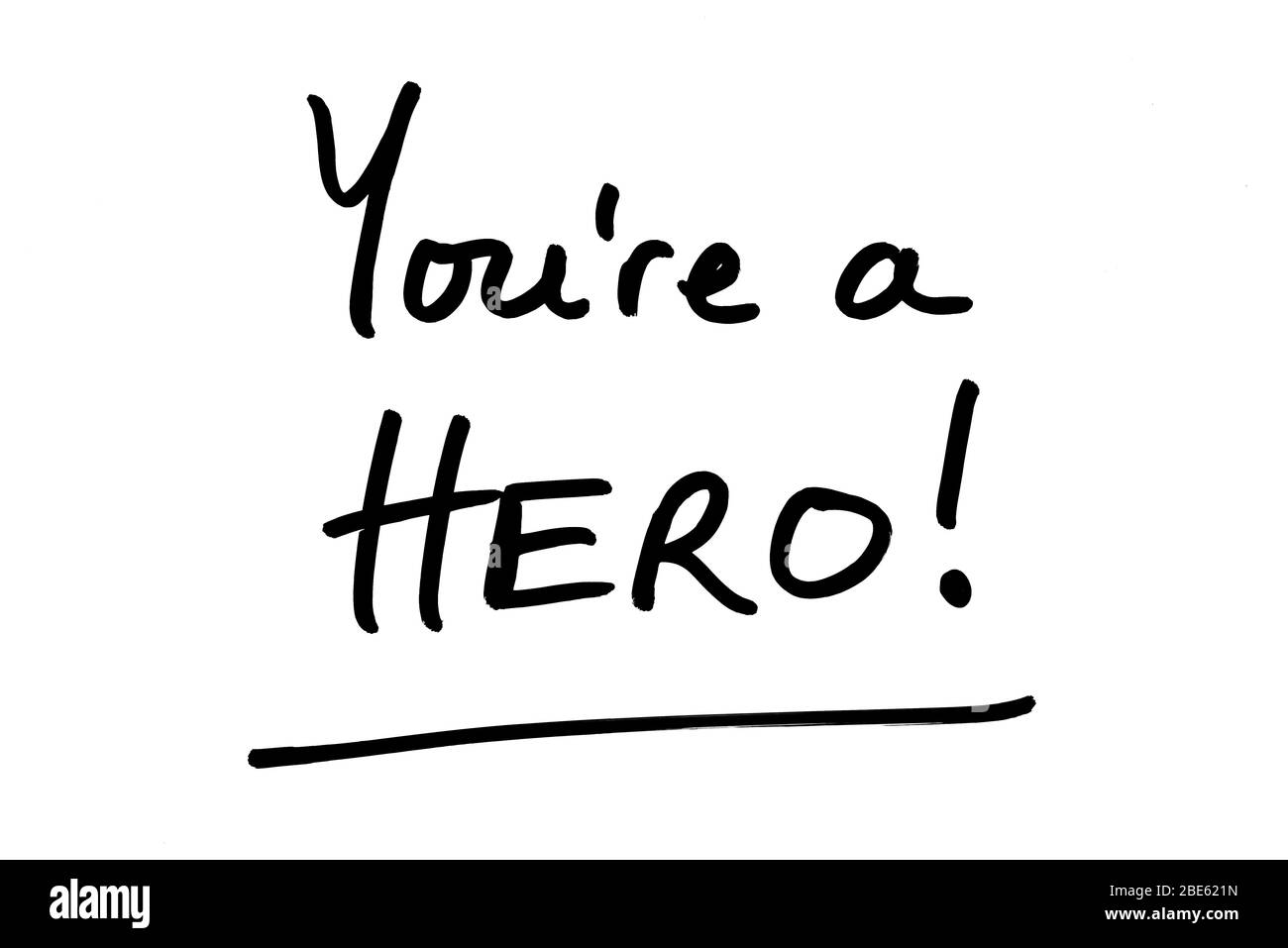 Youre a Hero! handwritten on a white background Stock Photo - Alamy