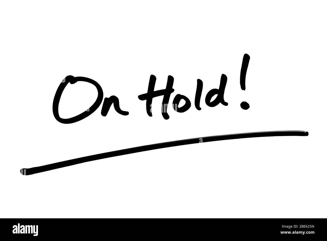 On Hold! handwritten on a white background Stock Photo - Alamy