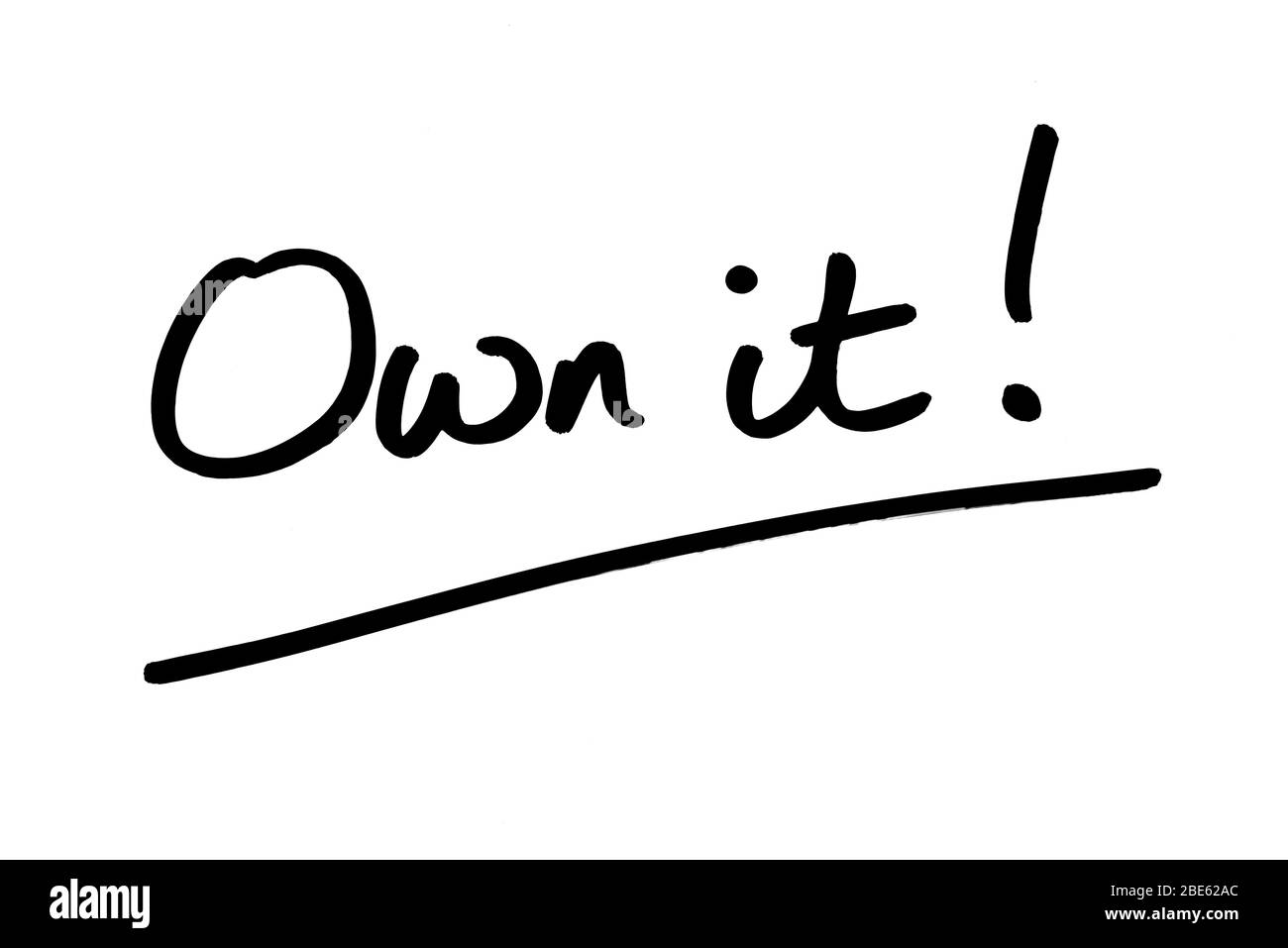 Own it! handwritten on a white background Stock Photo - Alamy