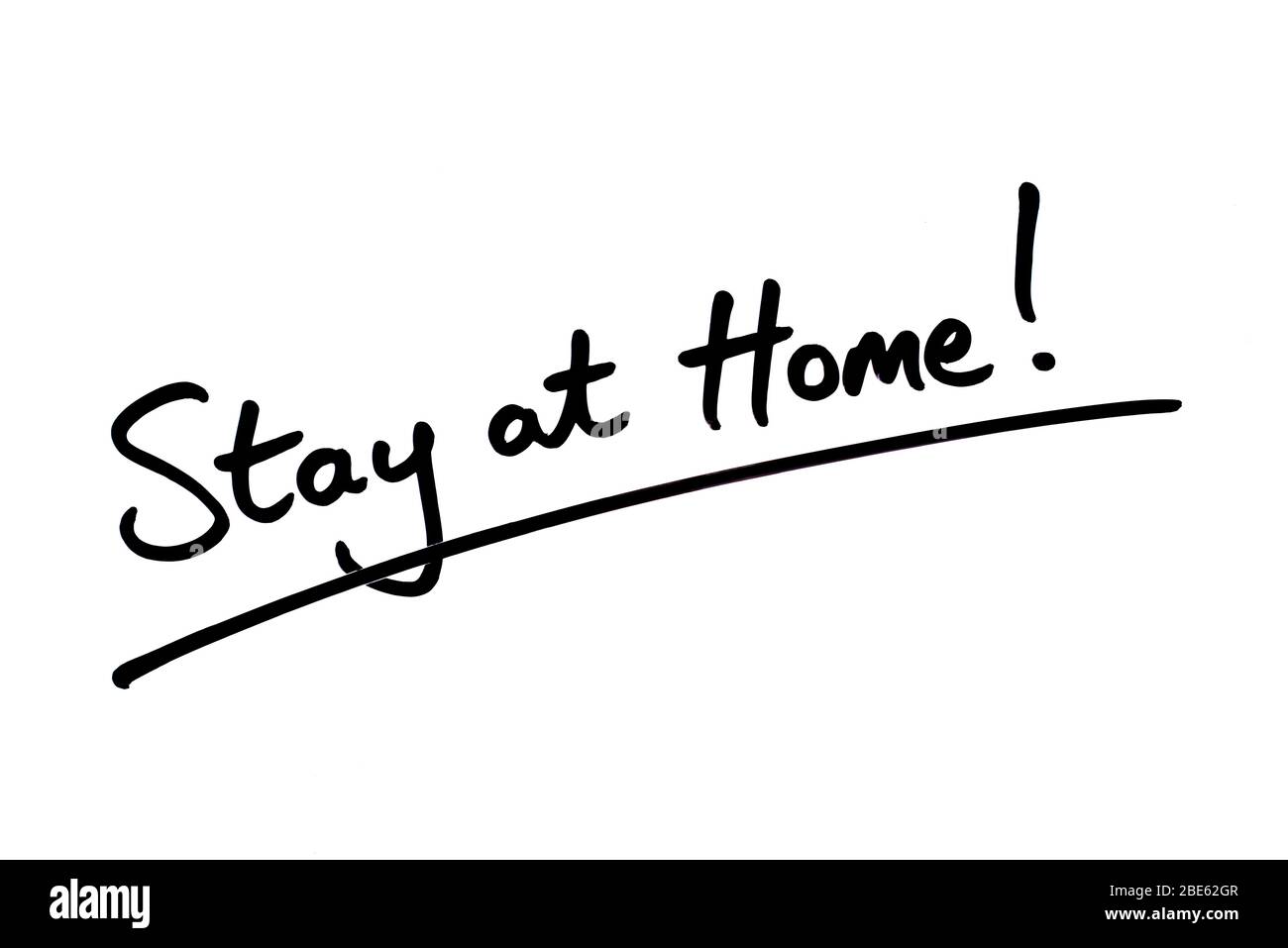 Stay at Home! handwritten on a white background Stock Photo - Alamy