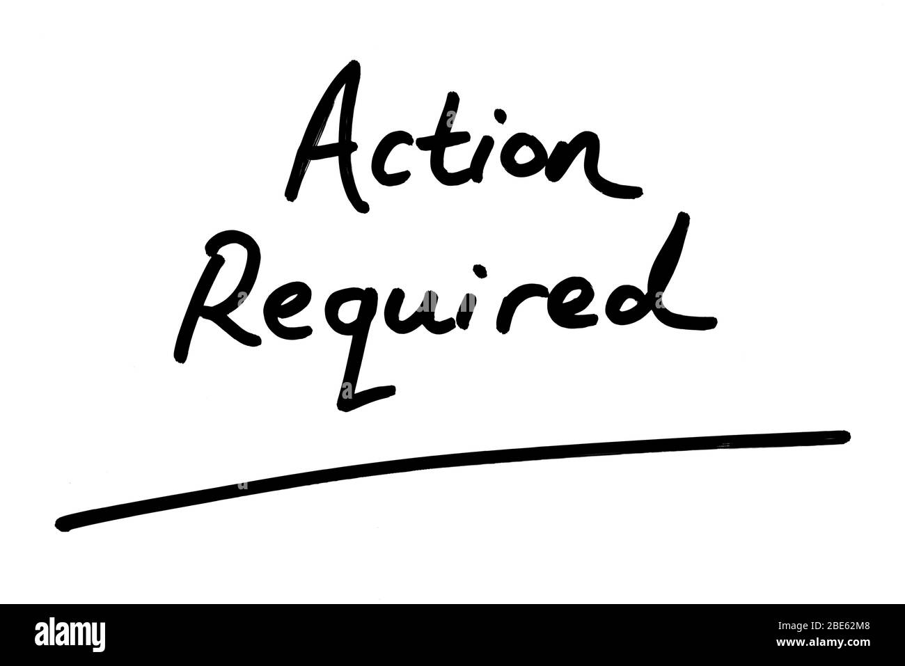 Action Required handwritten on a white background Stock Photo - Alamy