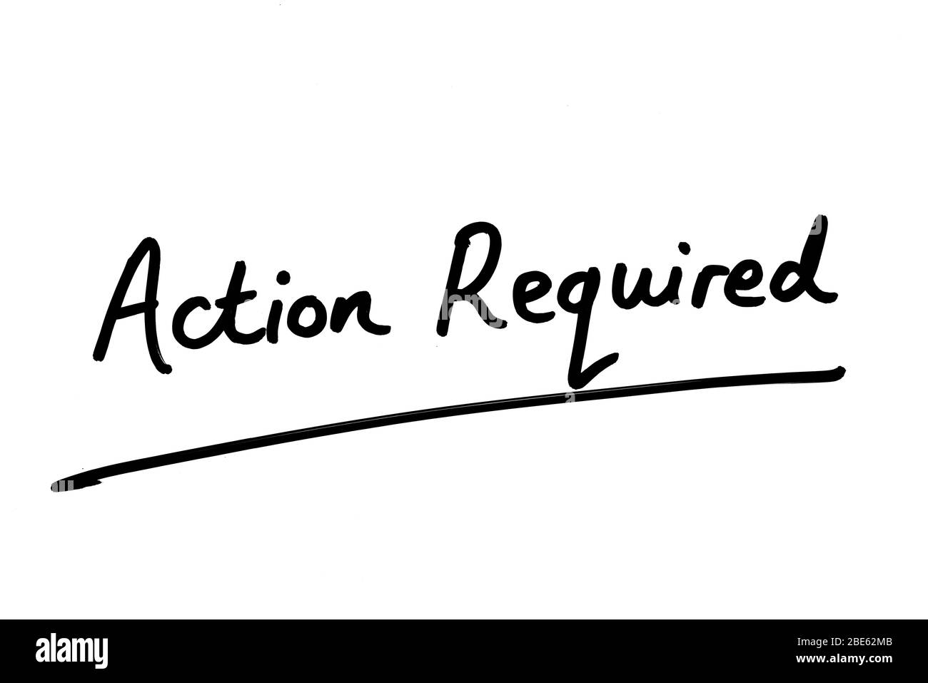 Action Required handwritten on a white background Stock Photo - Alamy
