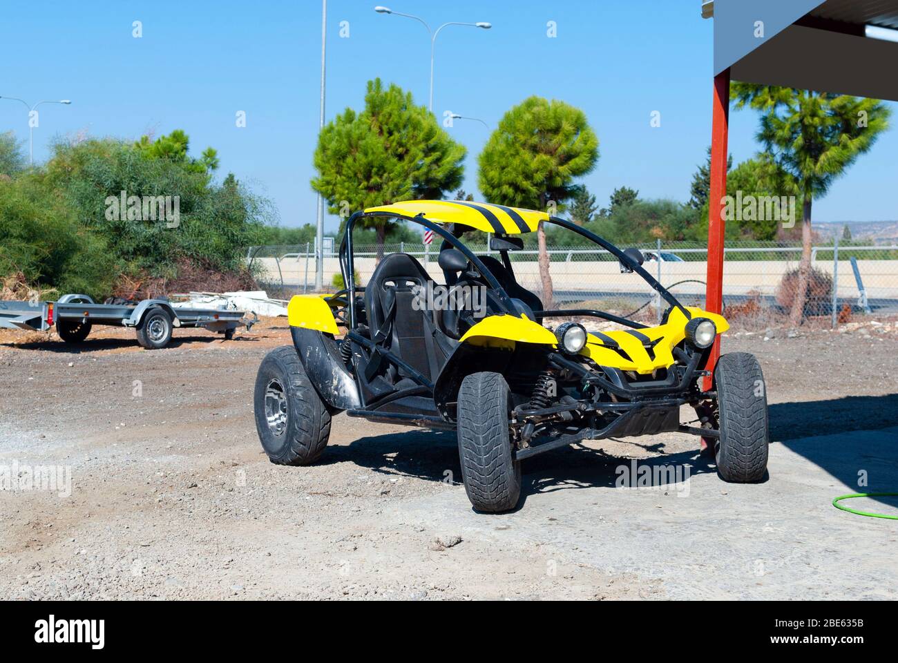 Yellow buggy on the street, Cyprus, Limassol Stock Photo - Alamy