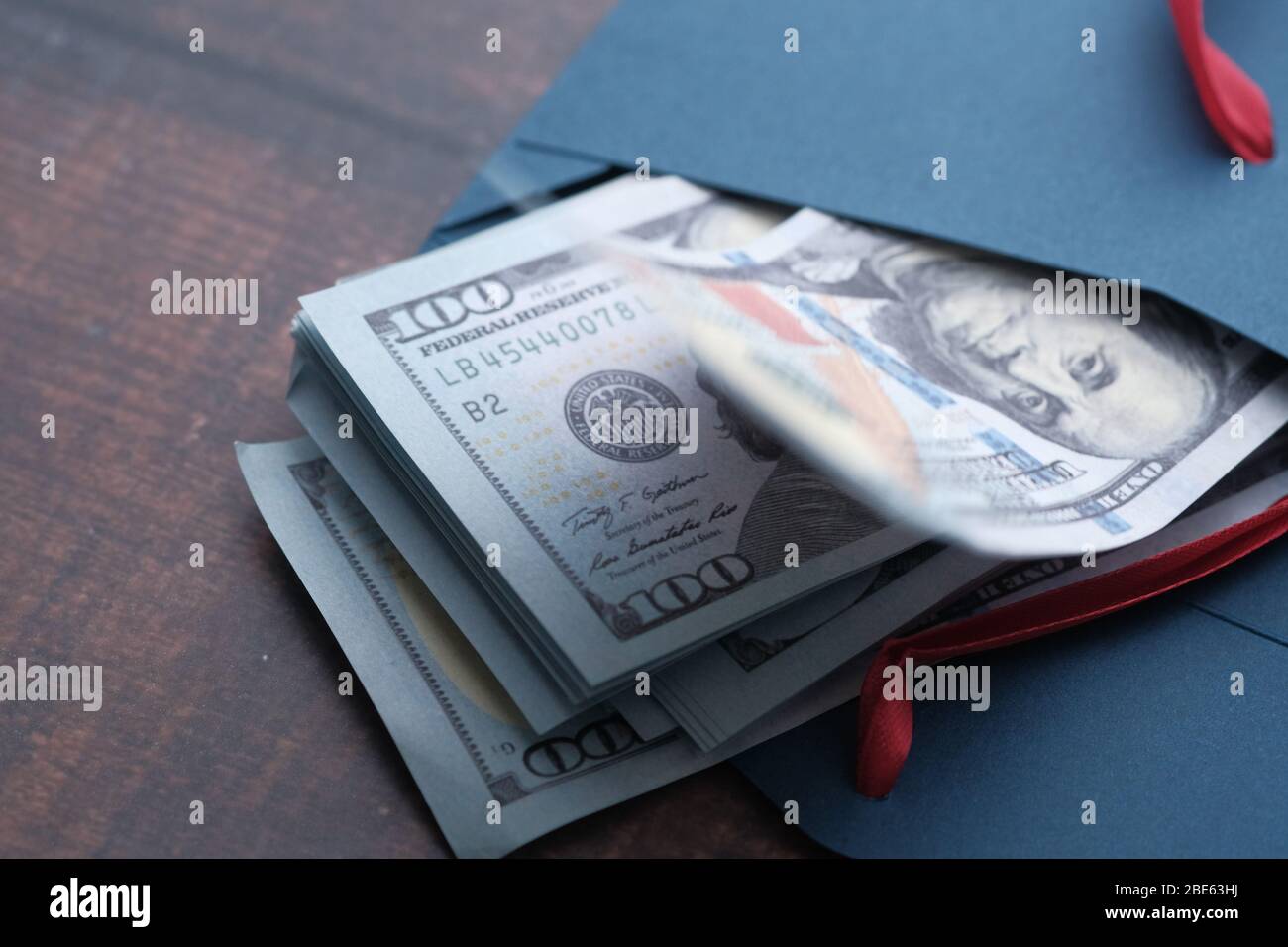 Cash in envelope hi-res stock photography and images - Alamy