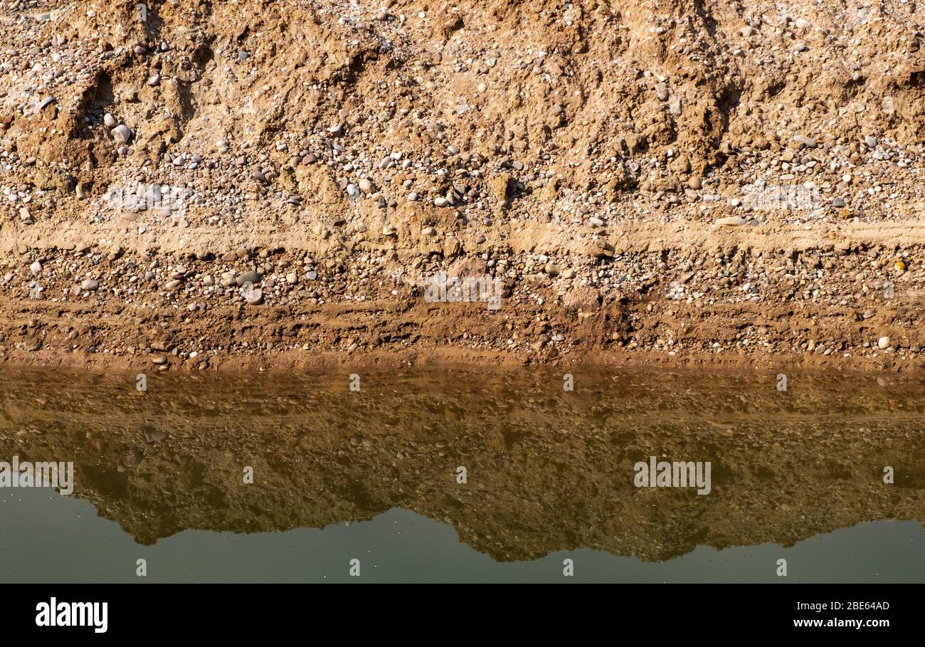 Layers of gravel and silt Stock Photo - Alamy
